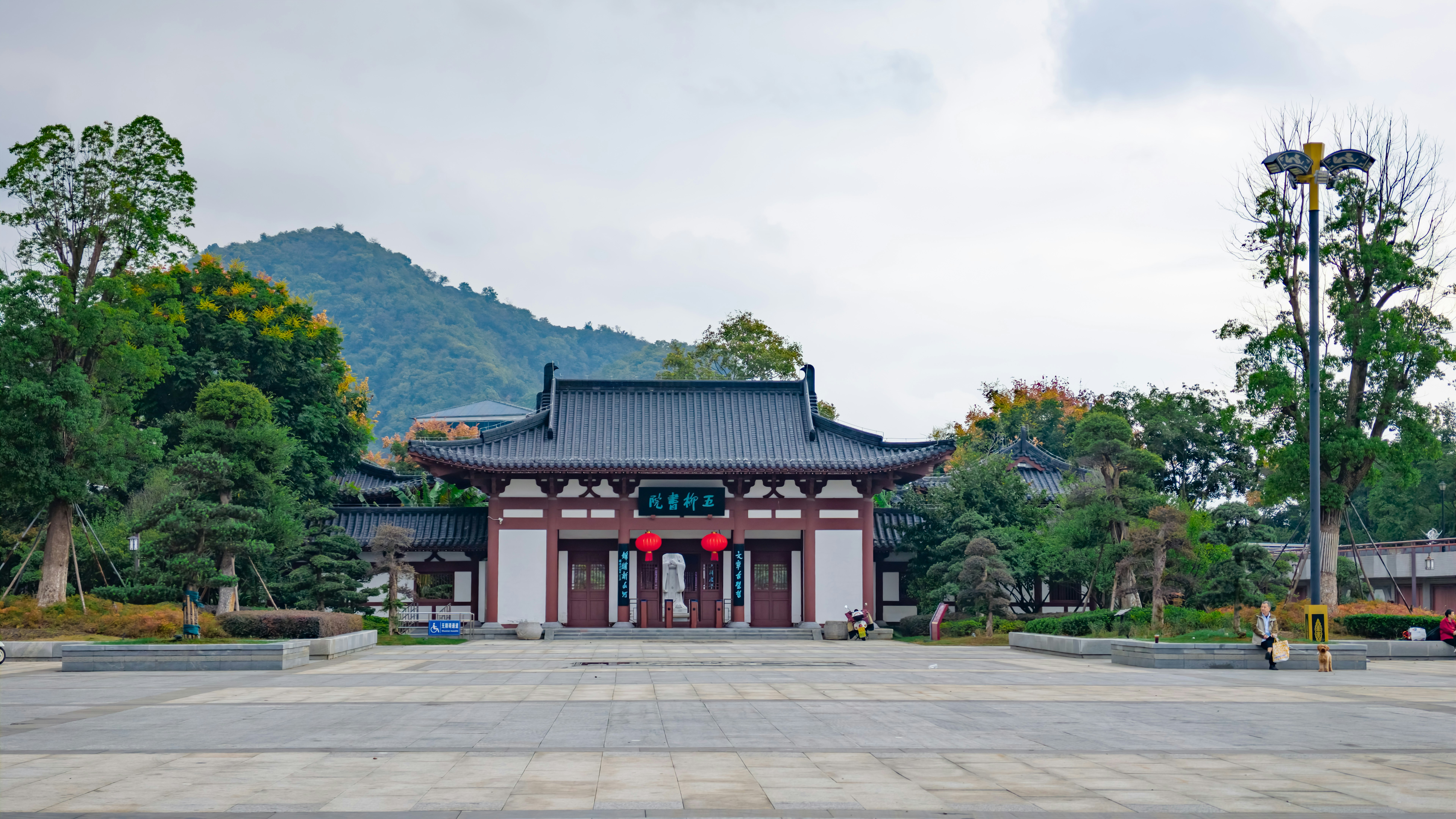 Gate of Tranquil Pace: Temple Courtyard Centered in Open Plaza