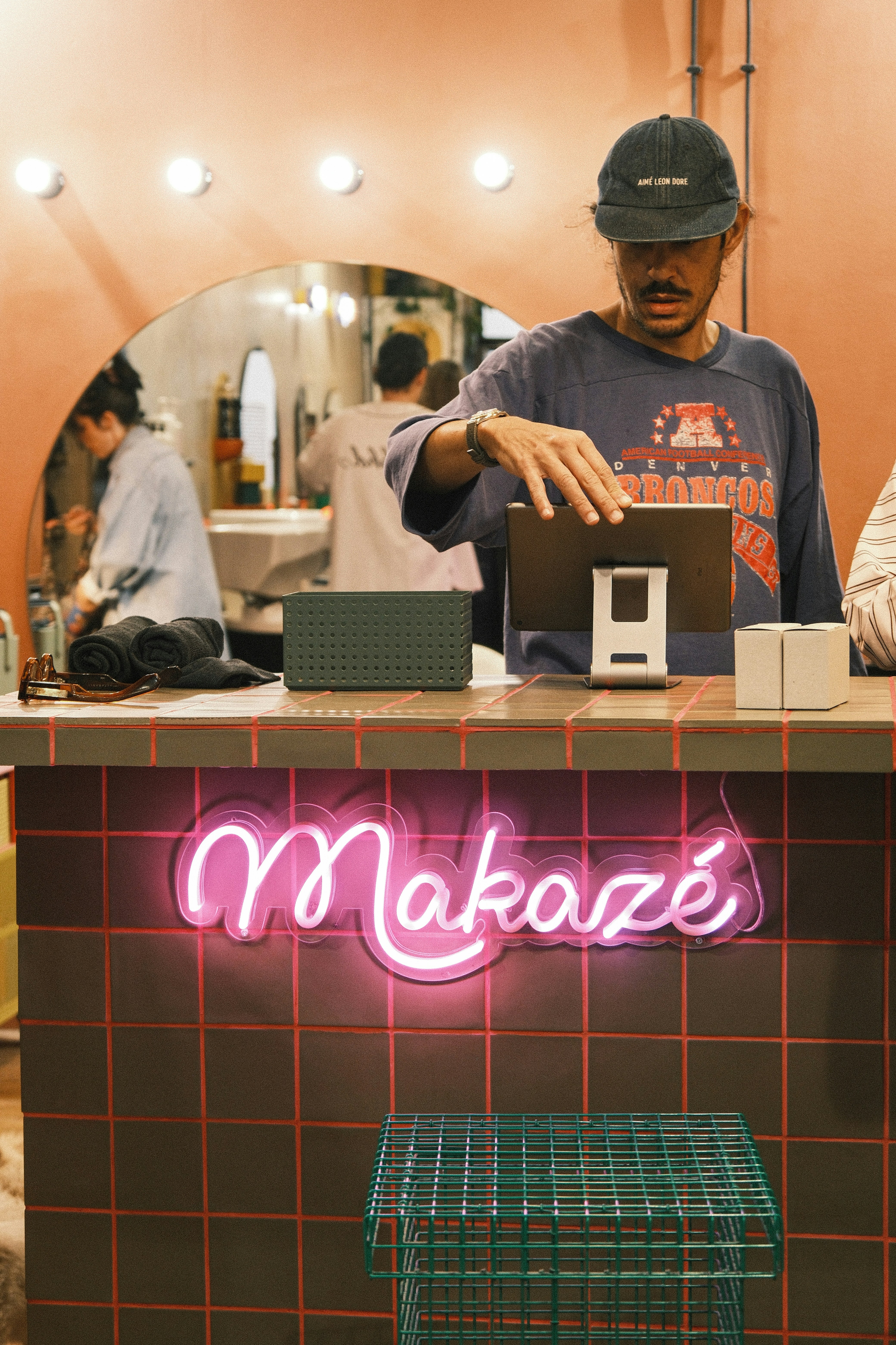 Neon Counterfront: A Portrait Behind the Makazé Sign