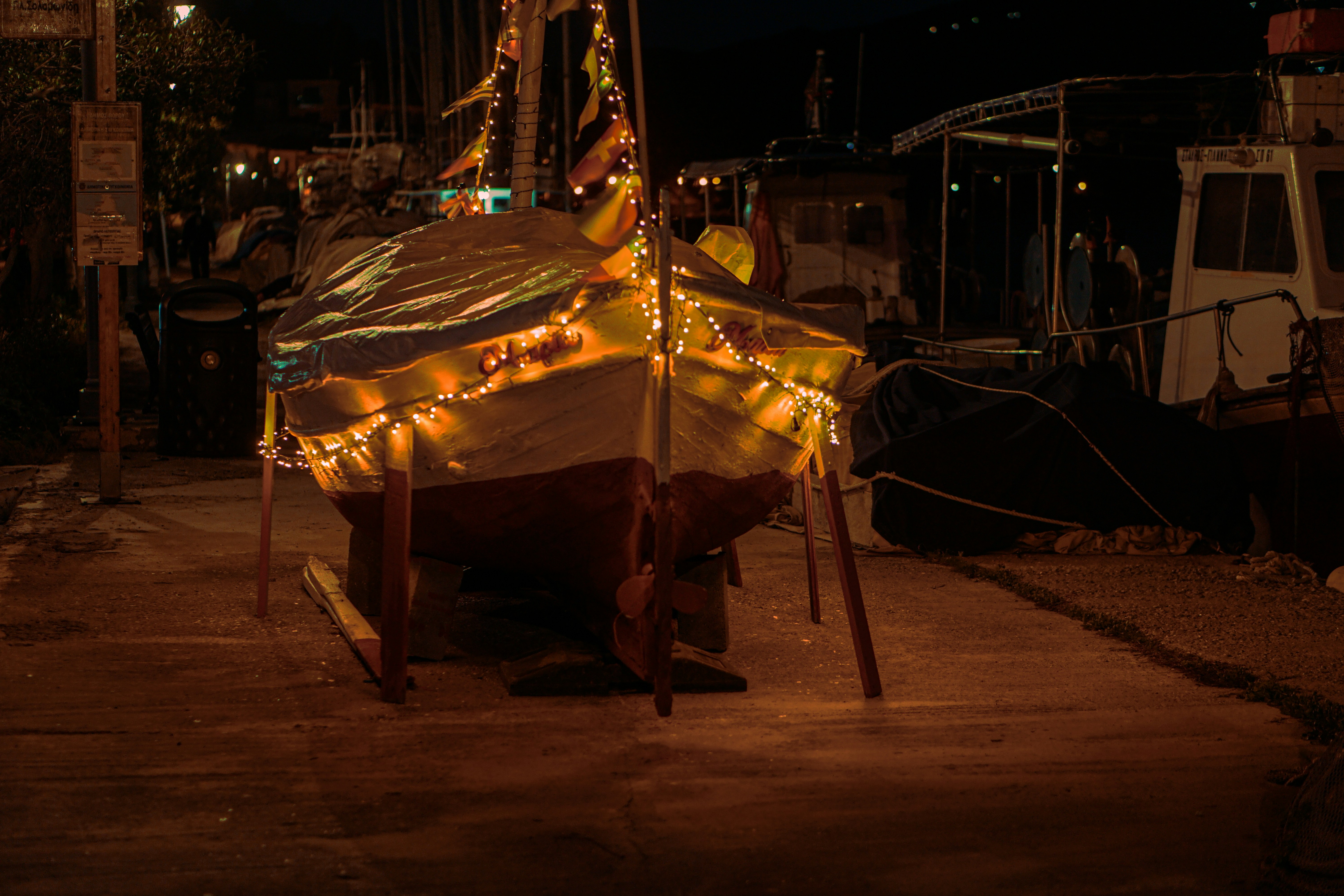 Glowing Boat at Dockside Night Market