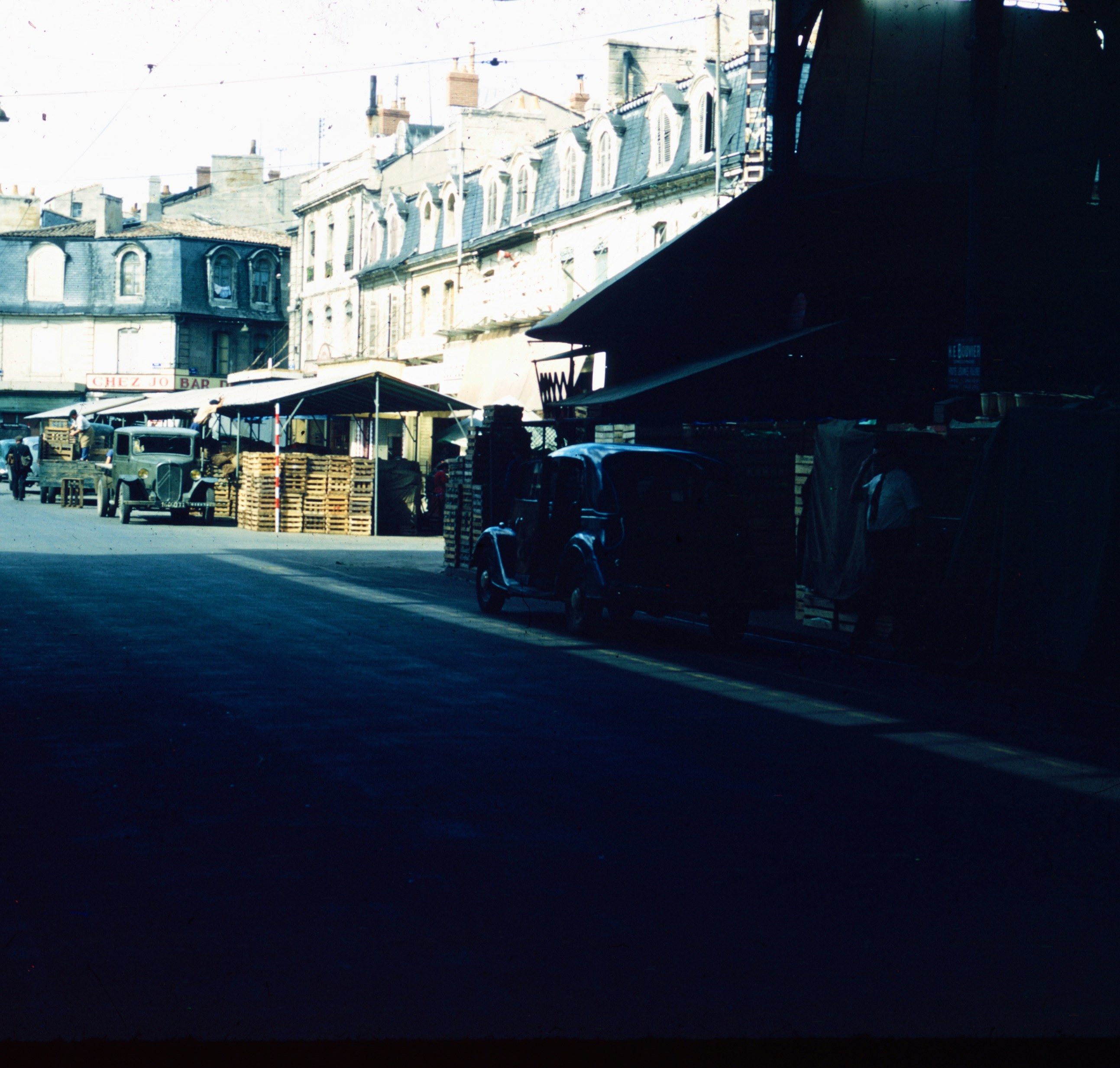Sunlit Street Market Adrift in Evening Hue