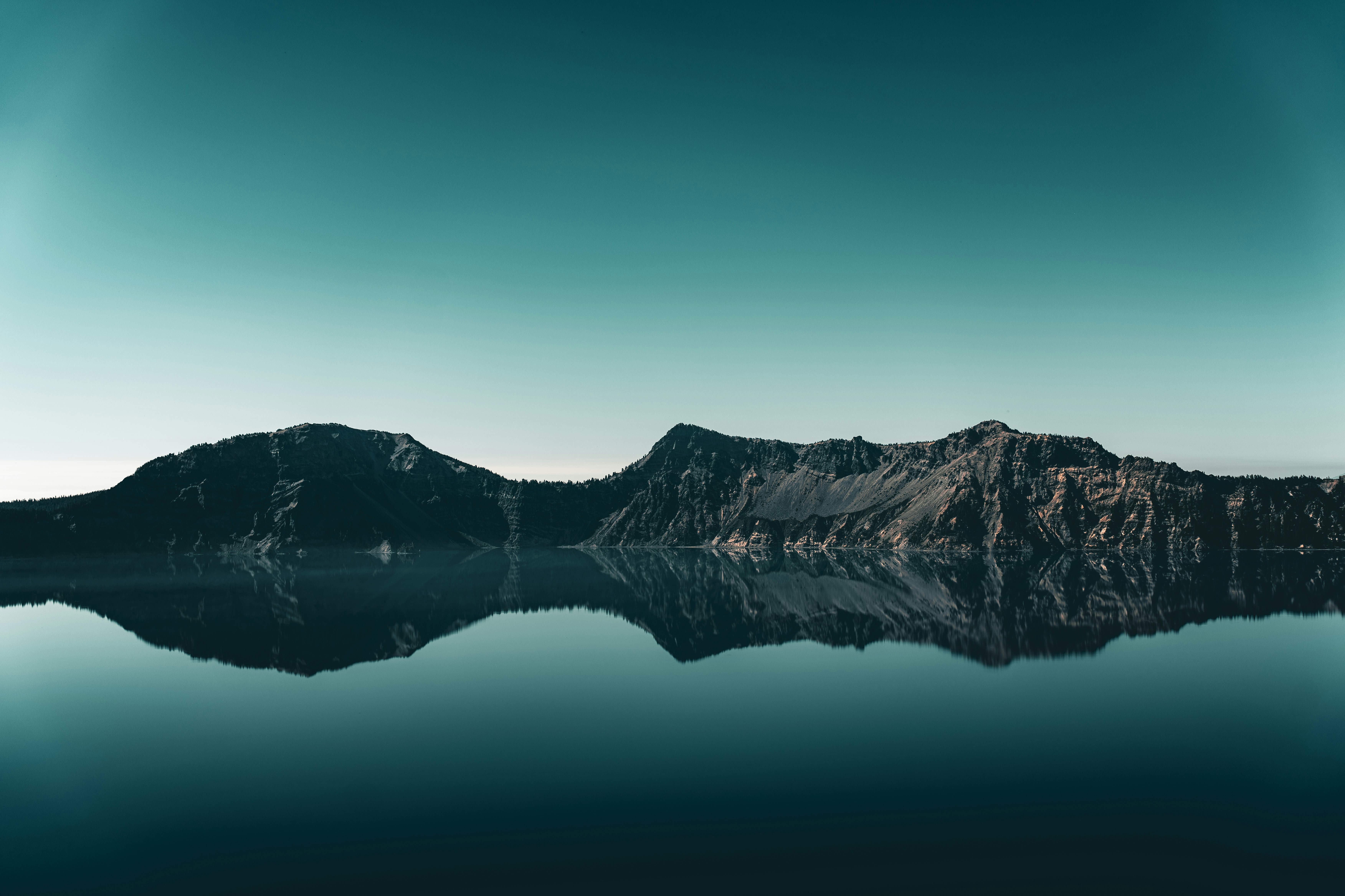 Silent Crest: Mountain Range Reflected in a Velvet Sky