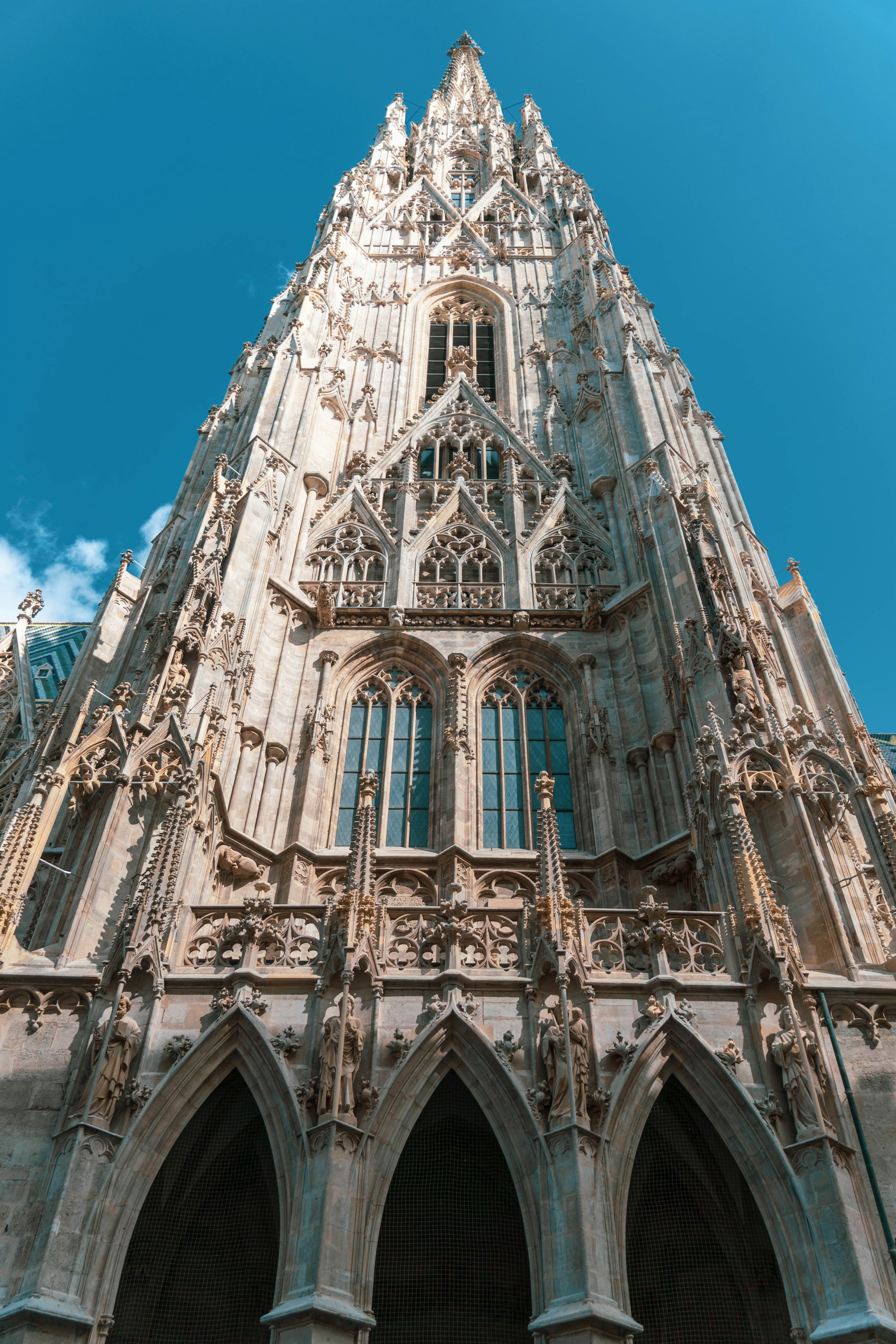 Gothic Cathedral Spire Reaching Toward a Clear Blue