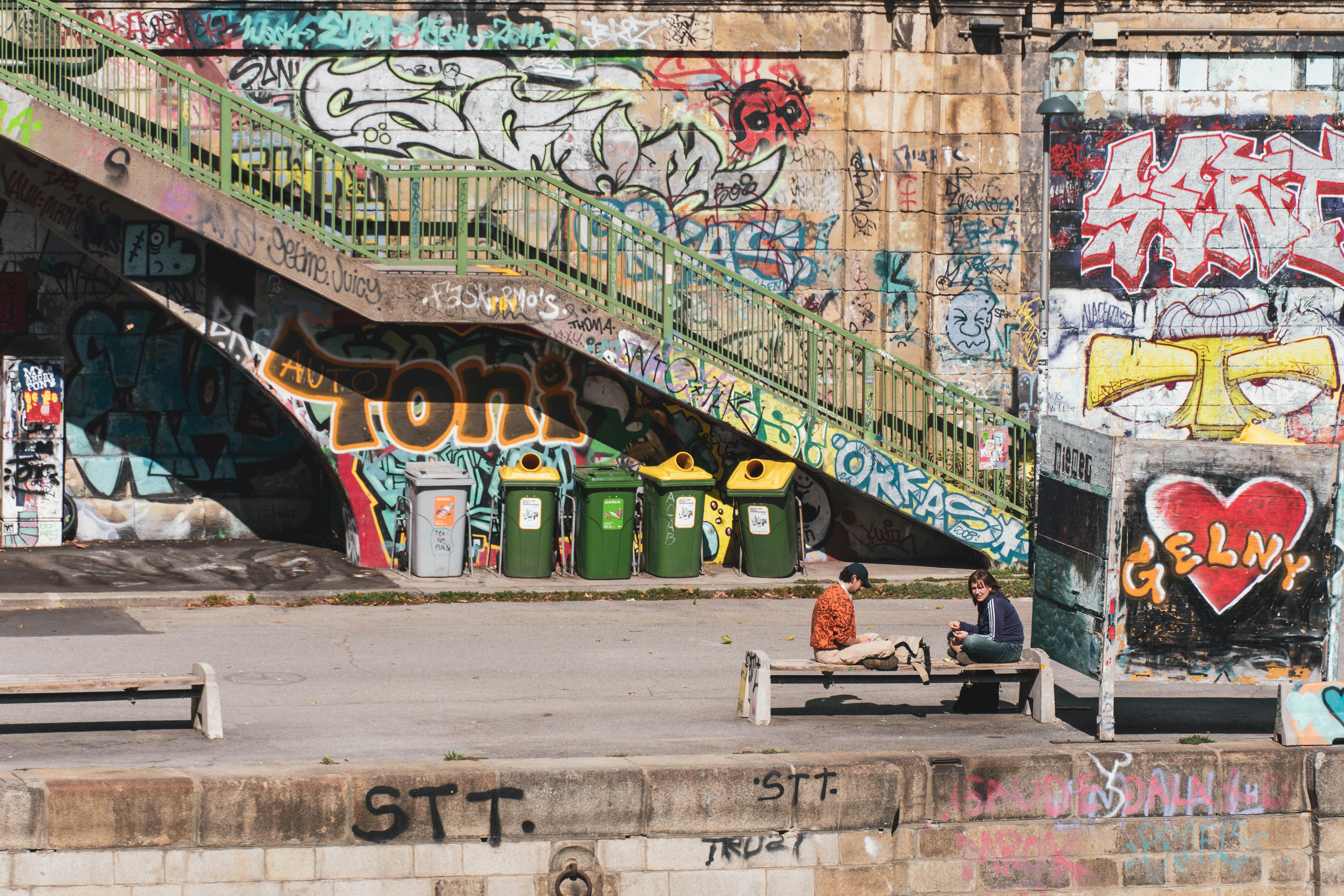 Graffiti Cliffs: Voices at the Riverside Courtyard