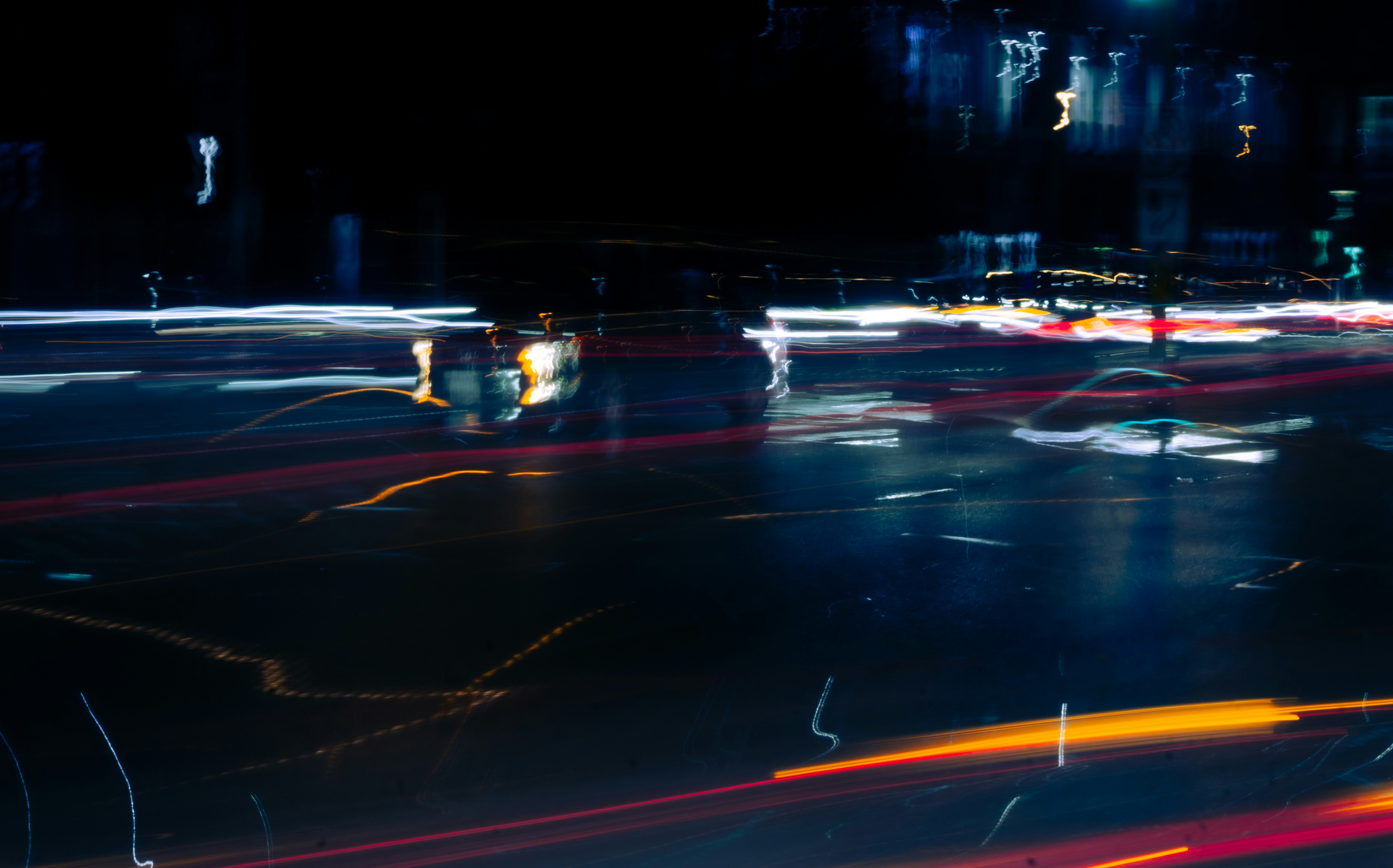 Blurred Neon Veins: Night Traffic in Motion