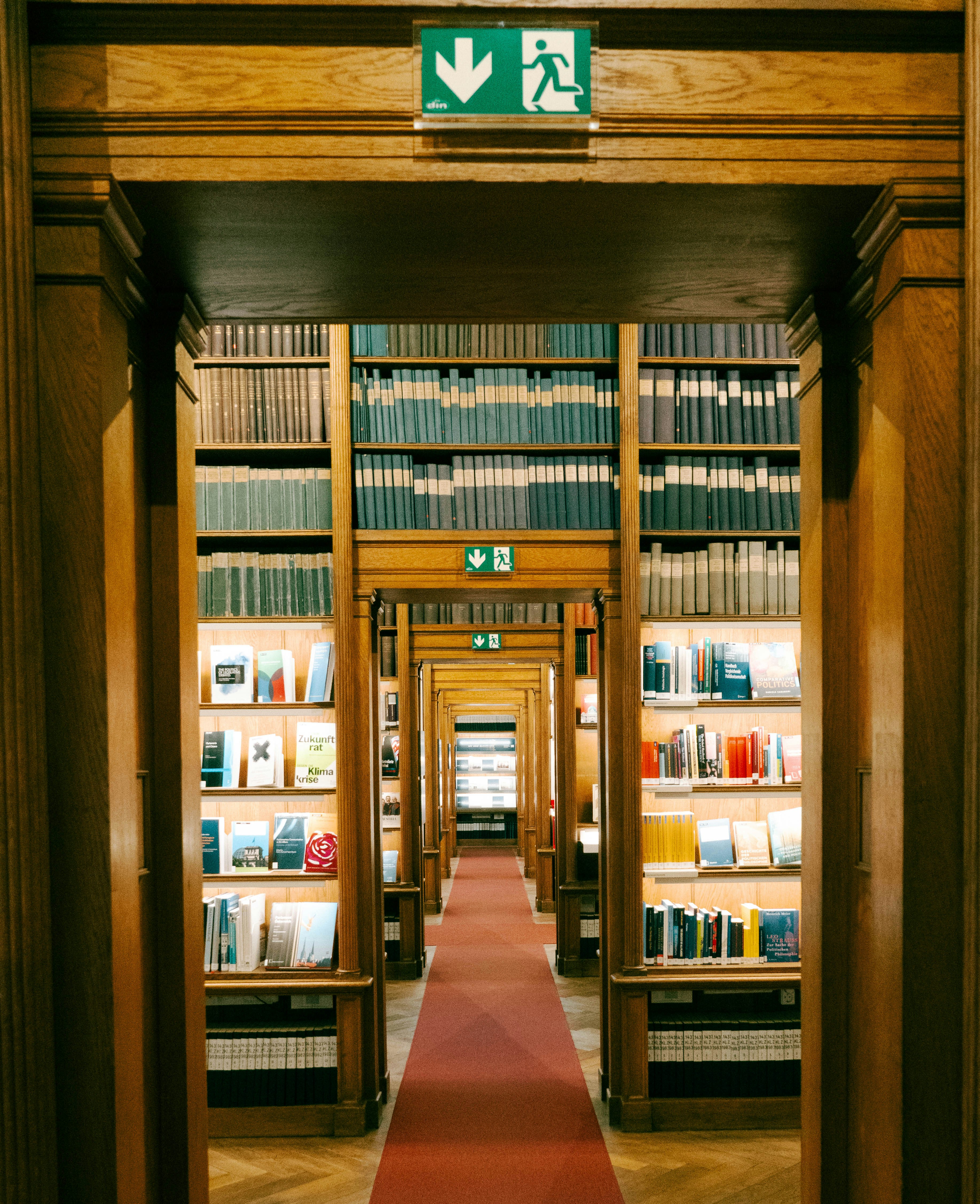 Endless Aisle: A Symmetrical Library Corridor