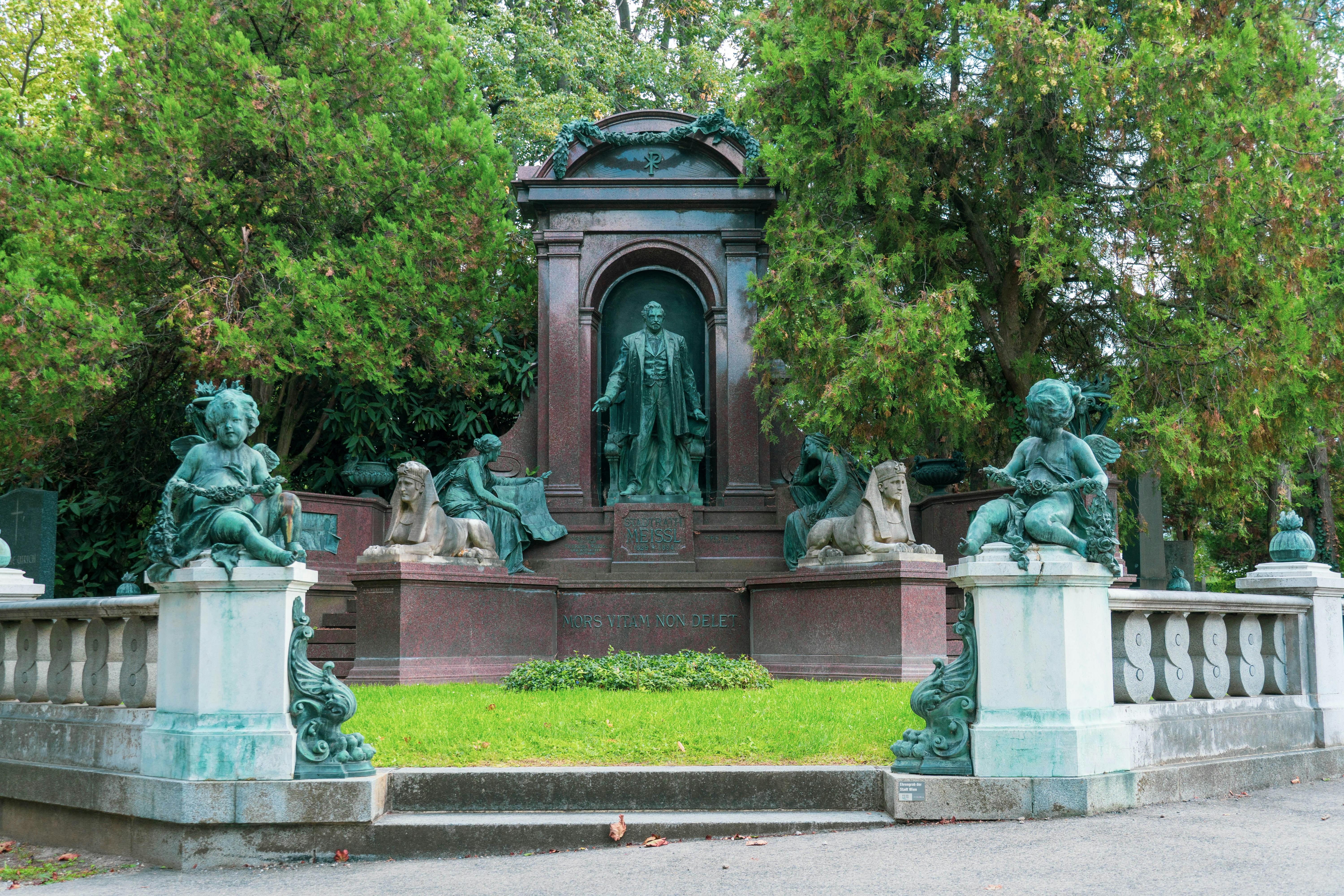 Statue Aligned Across the Terrace: A Monumental Garden Sculpture