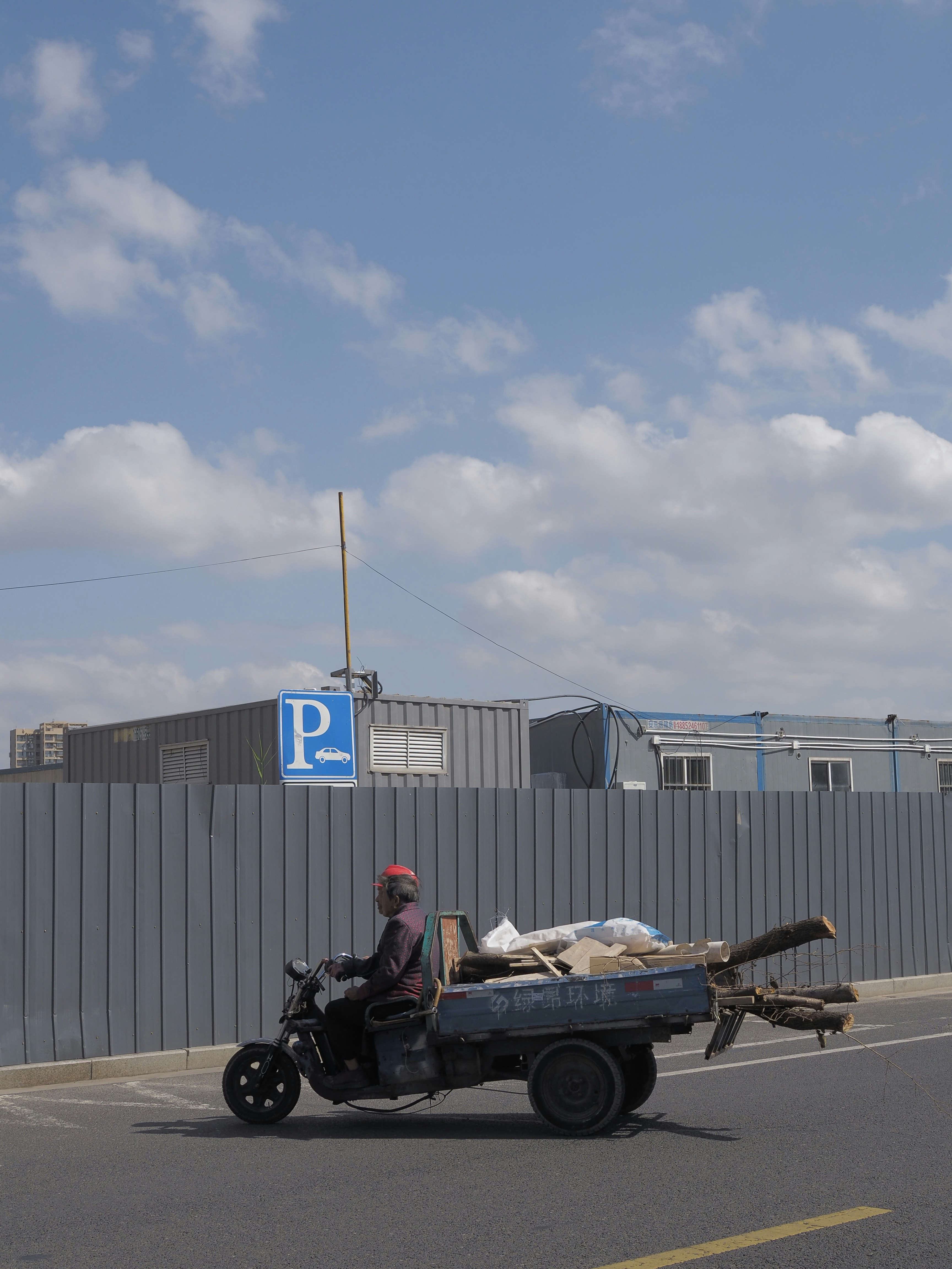 Rural Workhorse Under Gray Skies: A Pit-Stop Truck Trundle
