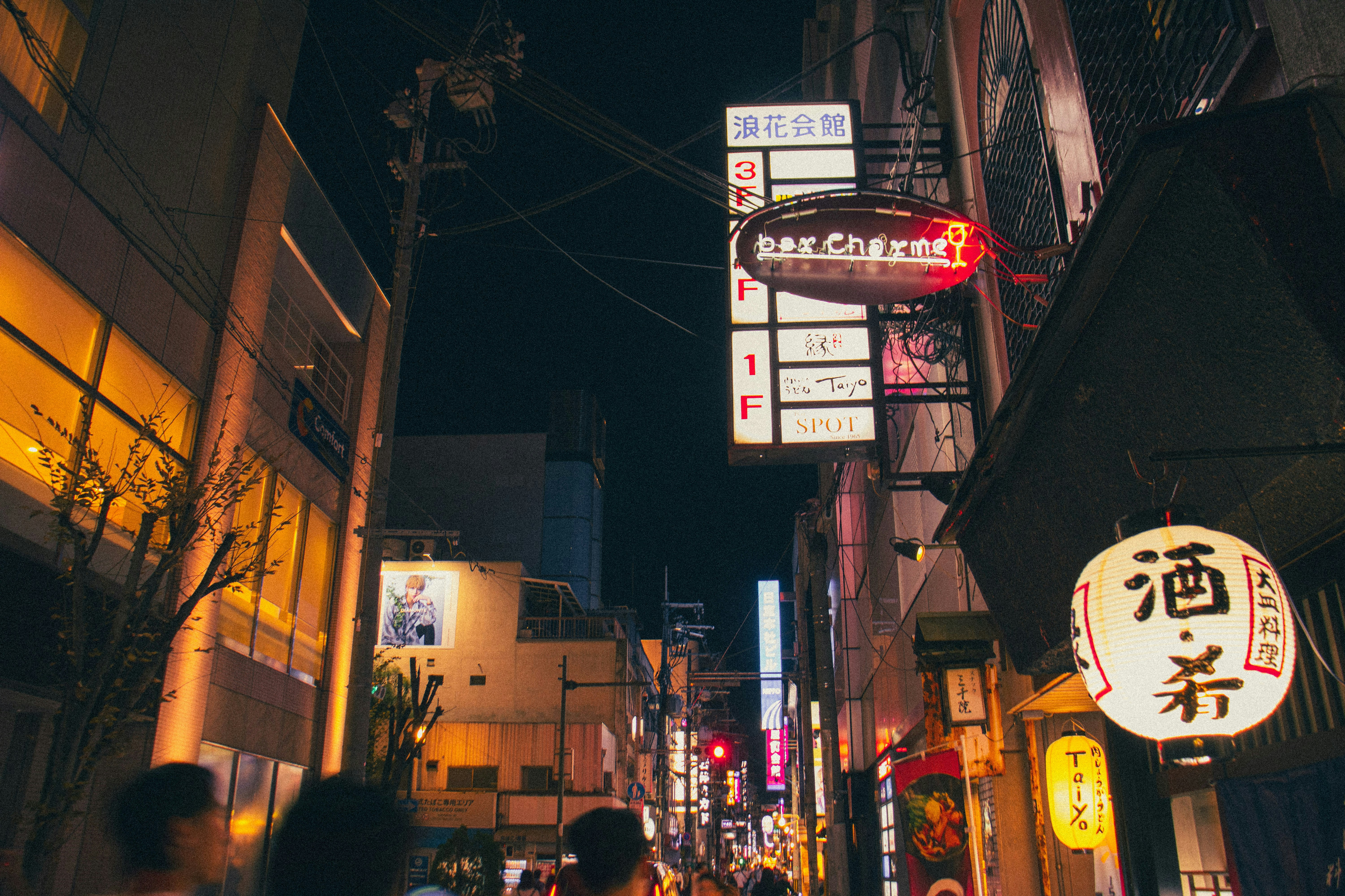 Neon Canal: Night Market Alley Anchored by a Lantern Glow