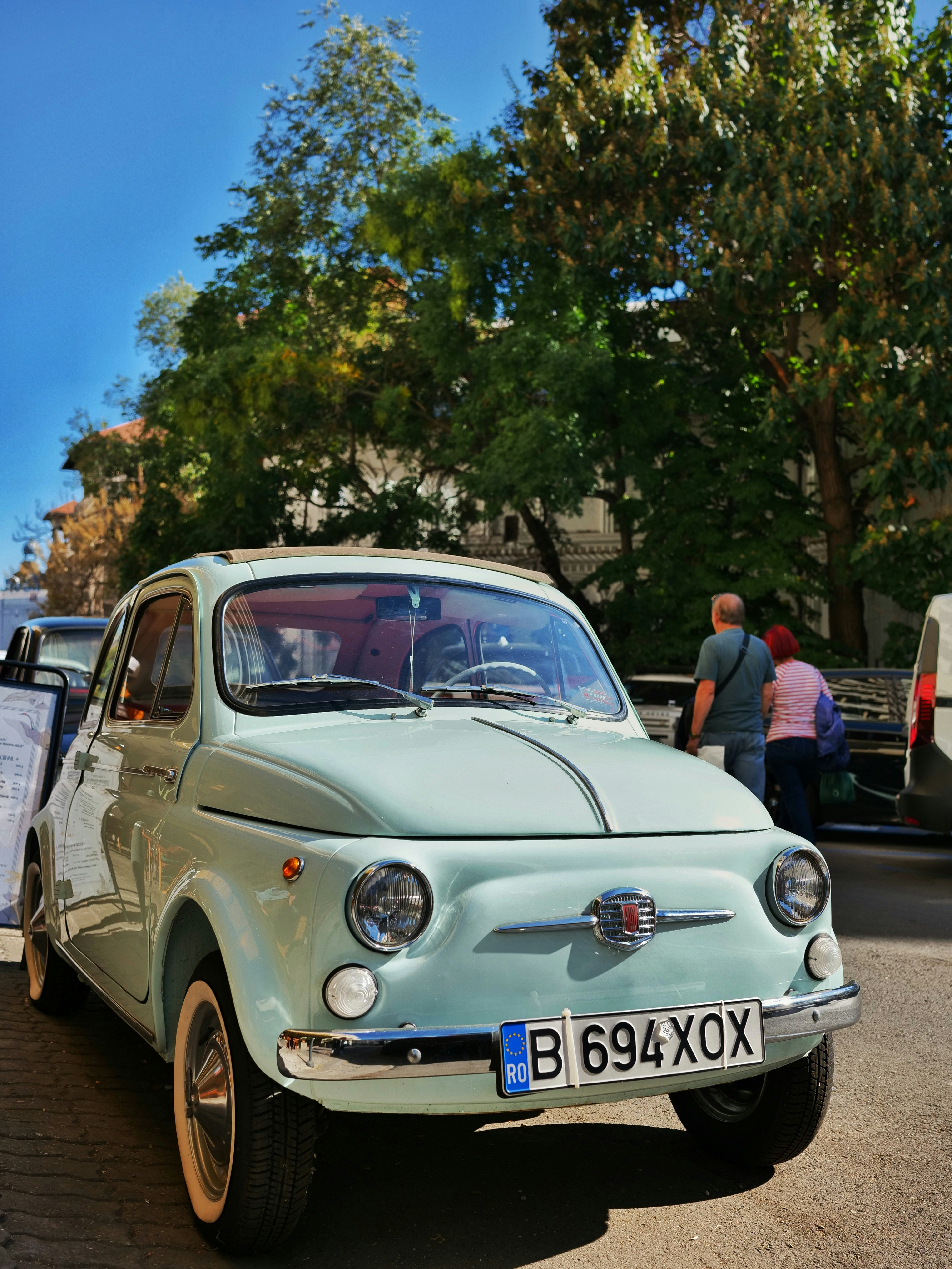 Minted Classic: The Fiat 500 in a Sunlit Street