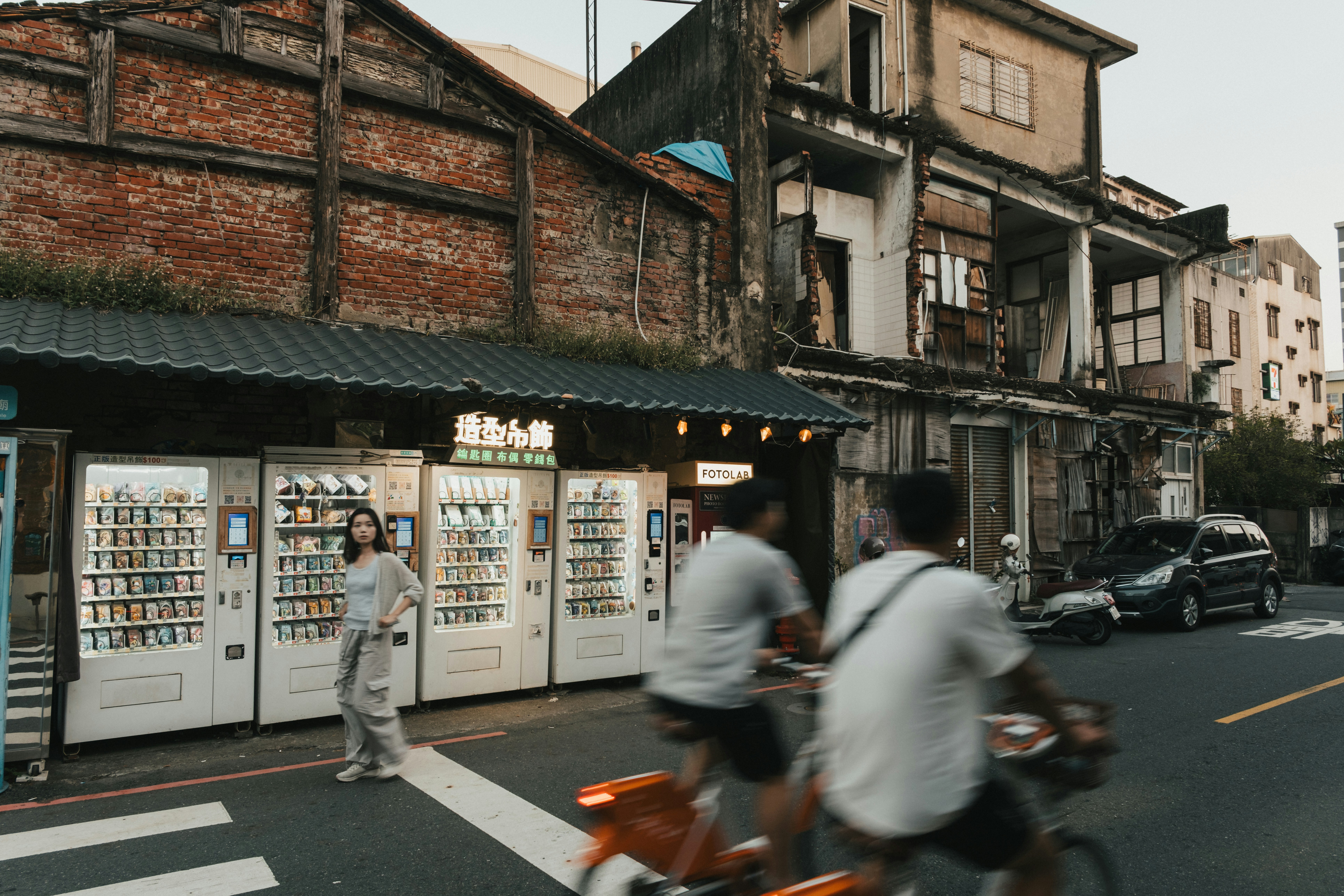 Streetfront Vending and Blurred Motion in a Quiet Alley