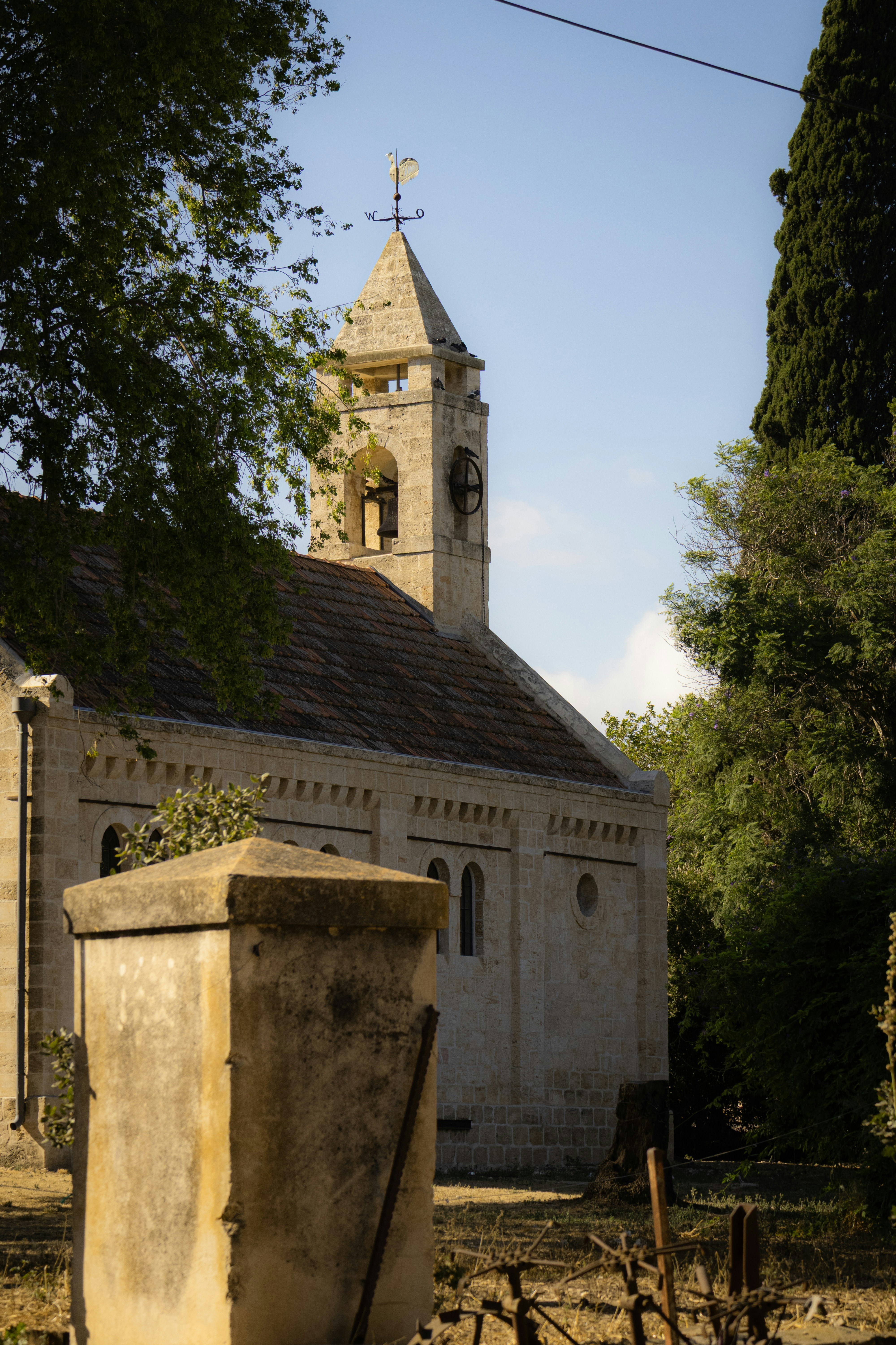 Stone Chapel Under a Bright Sky