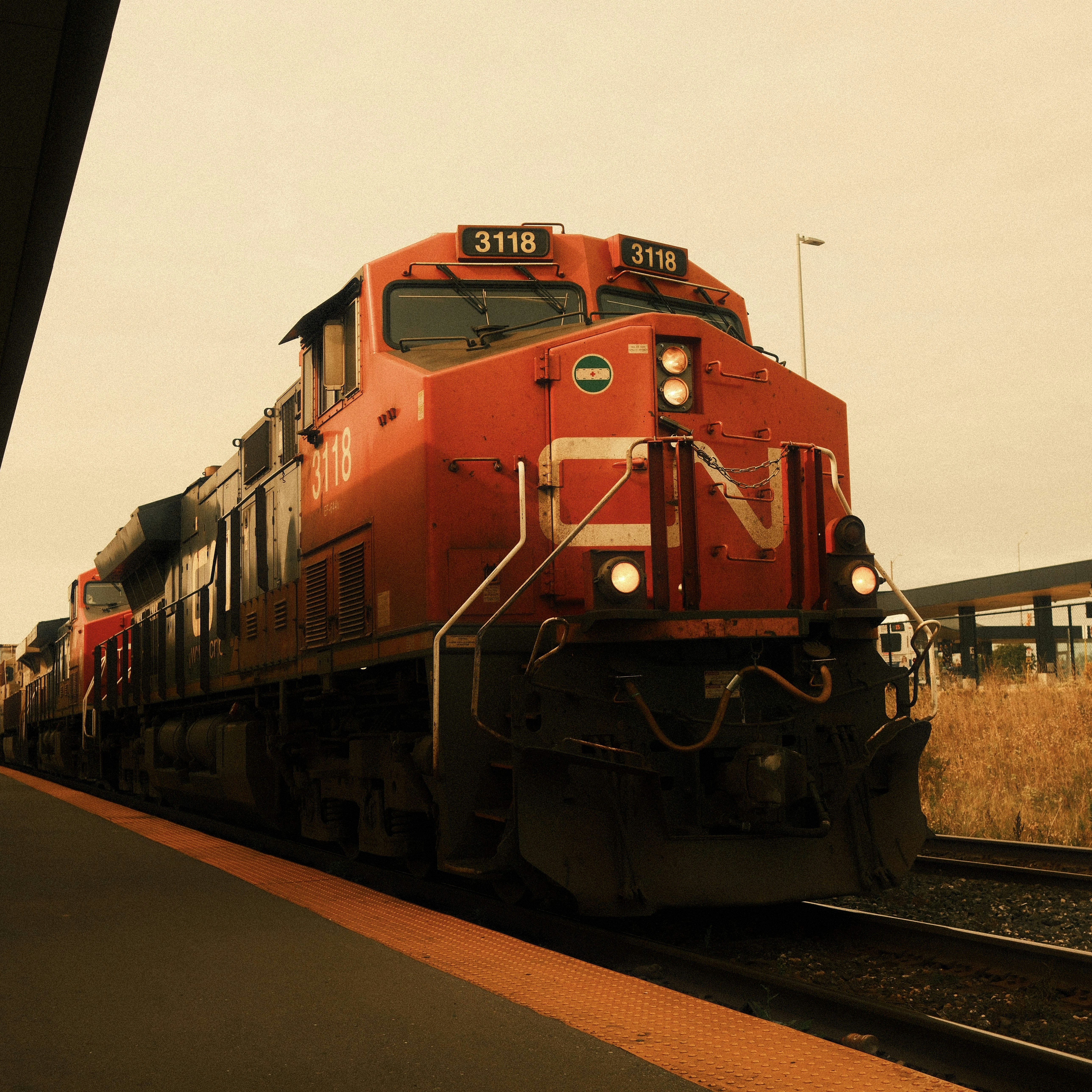 Locomotive at the Platform: Bold Red Power on a Quiet Morning
