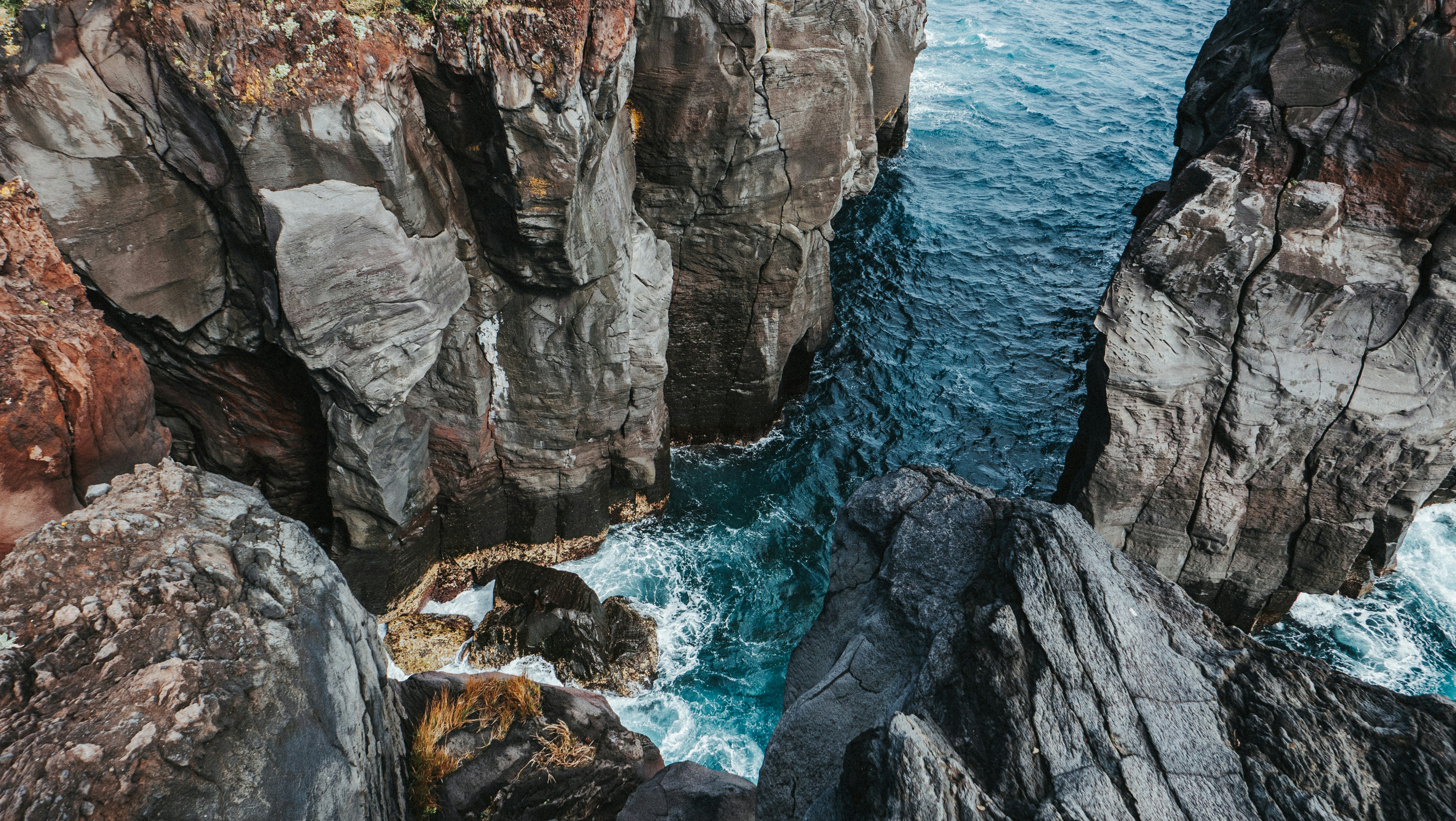 Sea-Gorge Confluence: A Narrow Channel Between Rugged Cliffs