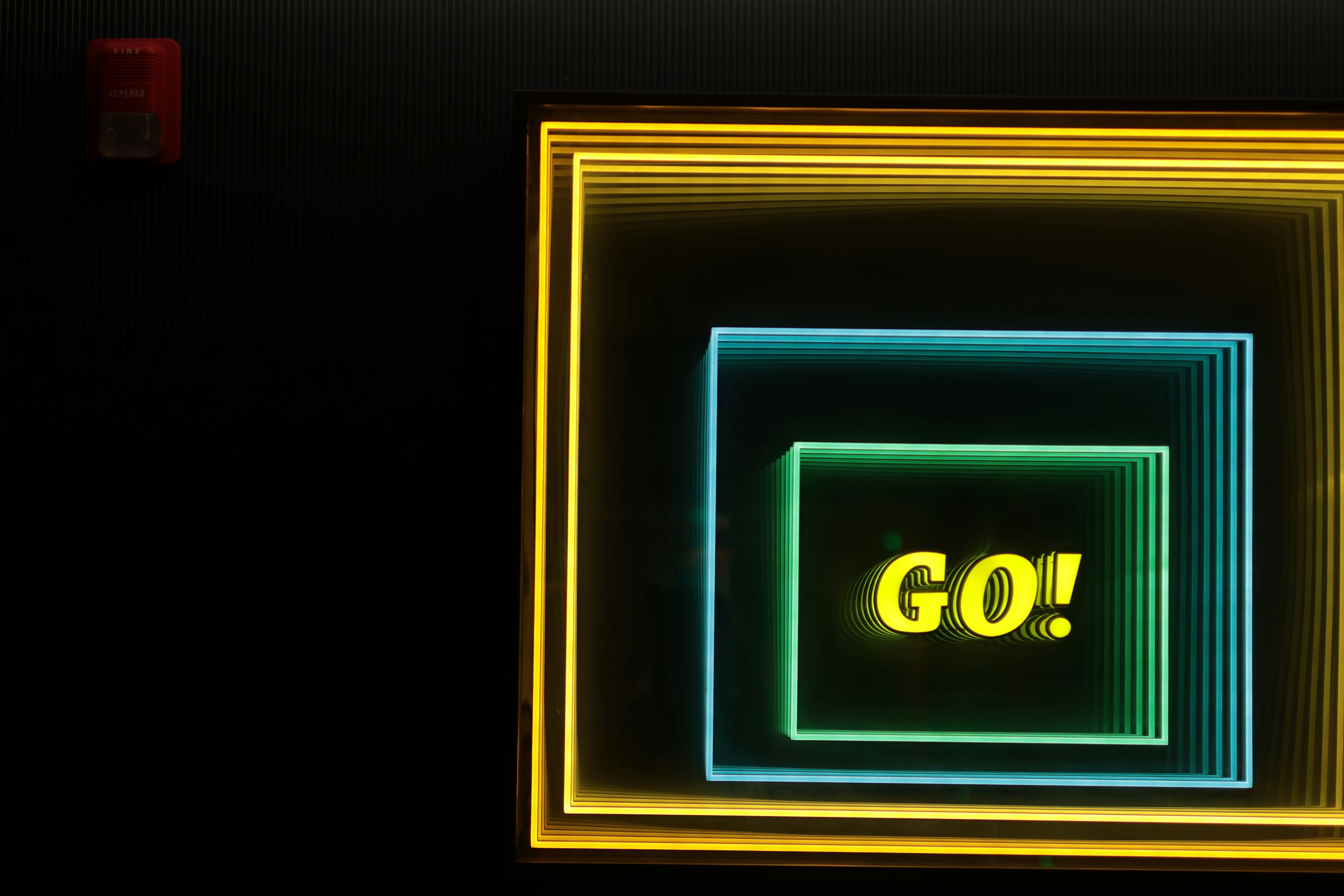 Neon Concentric Frames: The GO Centerpiece