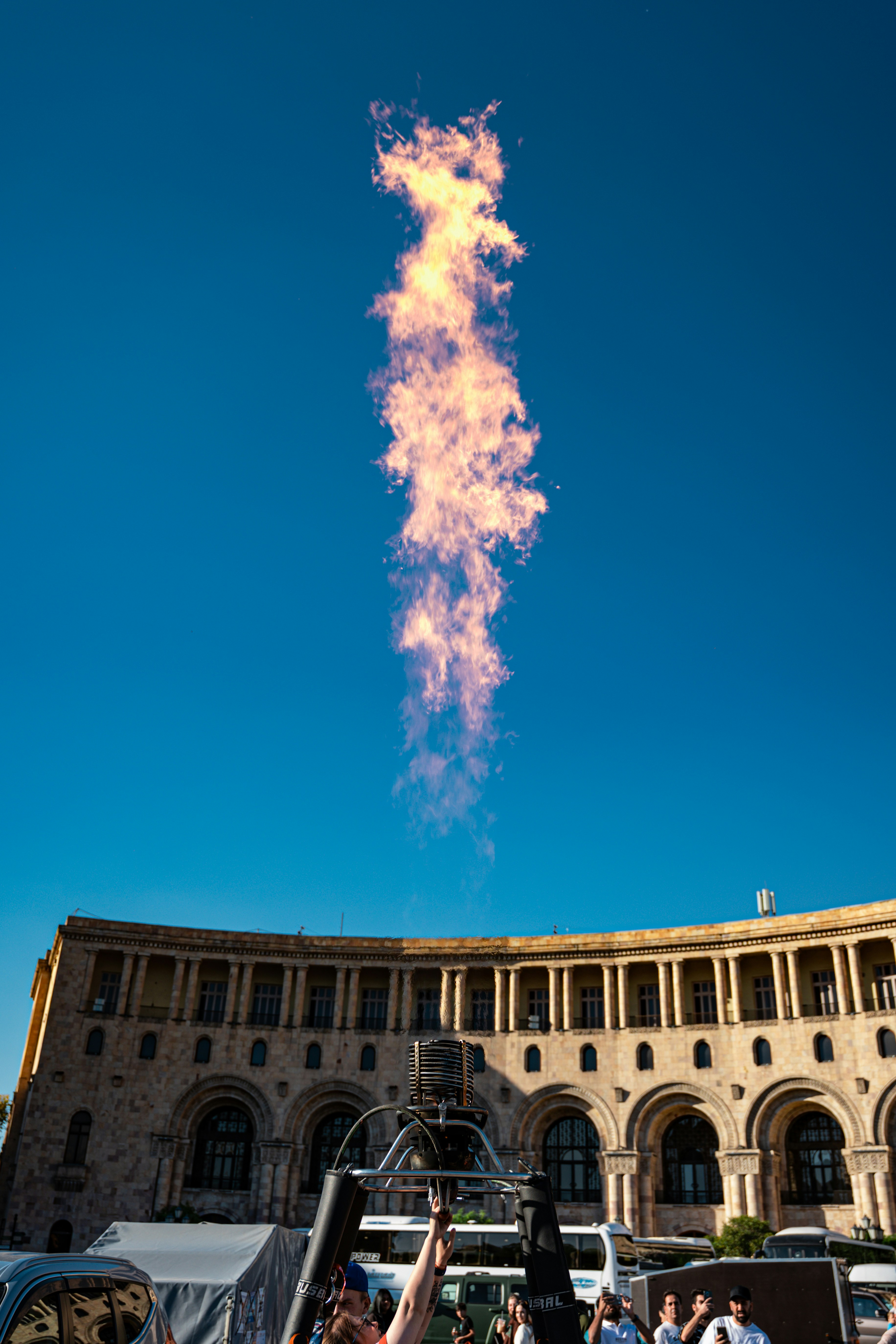 Ignition over the Forum: a ceremonial plume rises above the colonnade