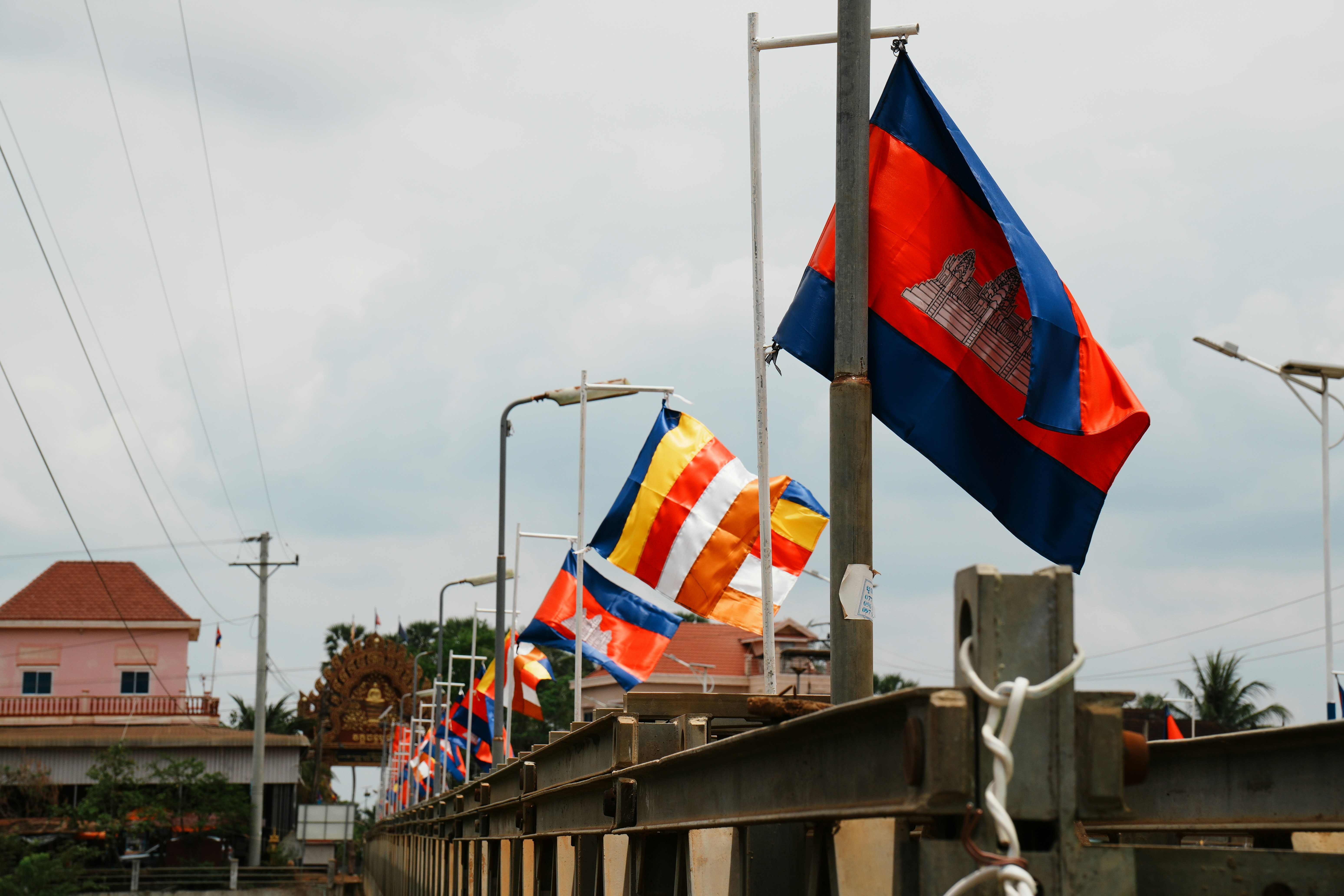 Flags on a Bridge: Colorful Maritime Promenade