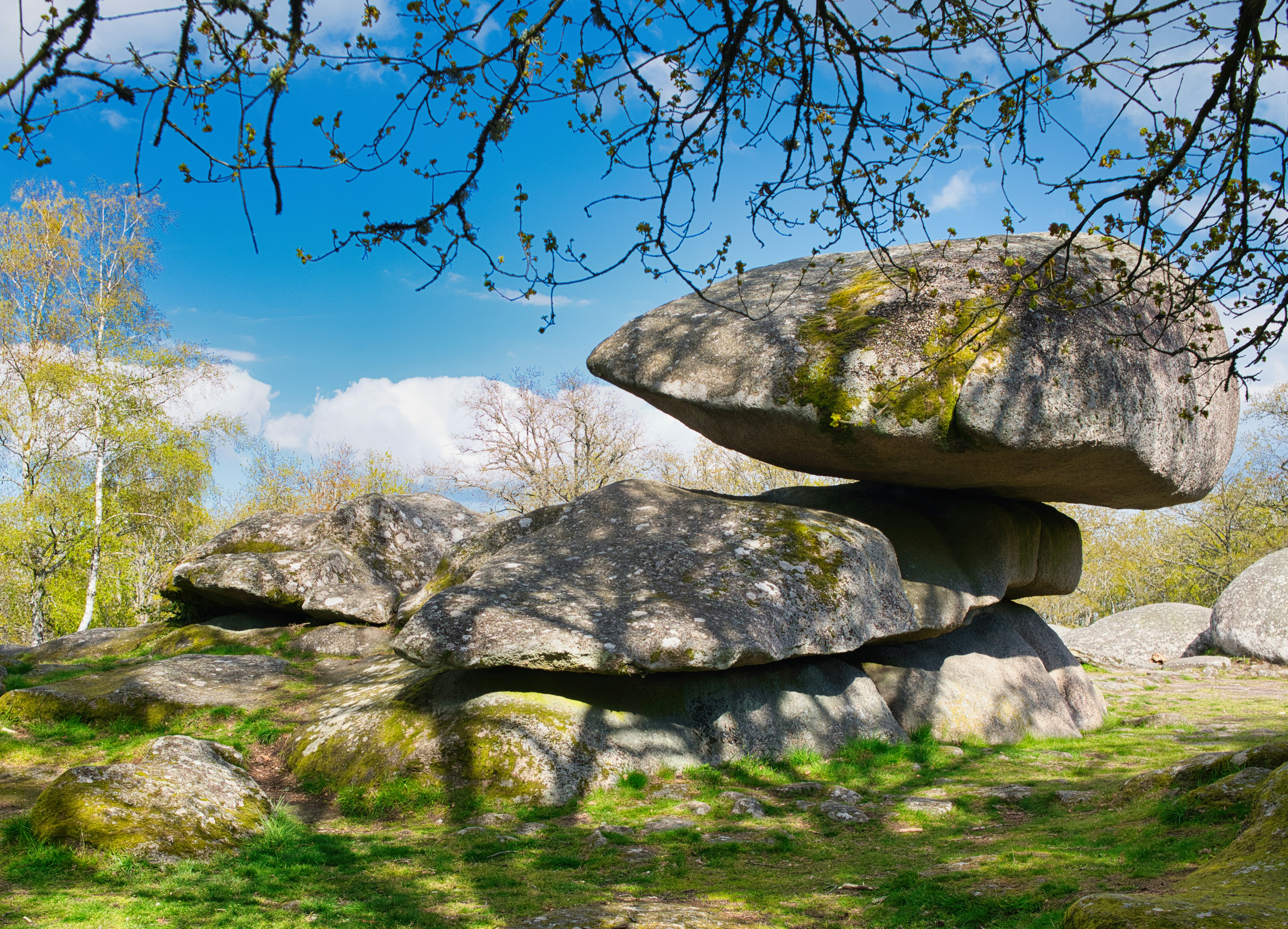Balanced Giants: A Deserted Rock Stack under a Spring Sky