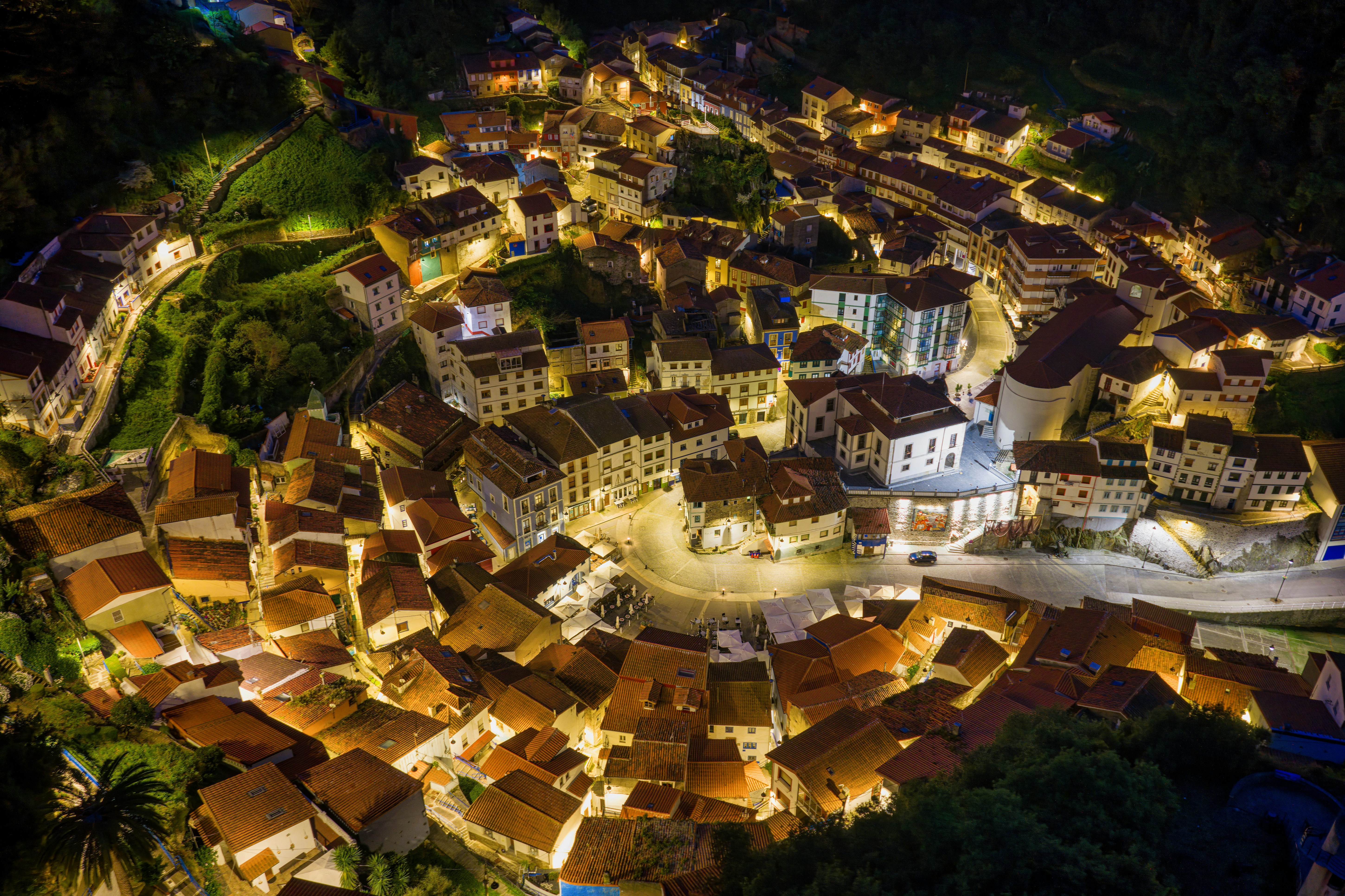 Nightlit Village: A Coiled Spiral of Warm Windows