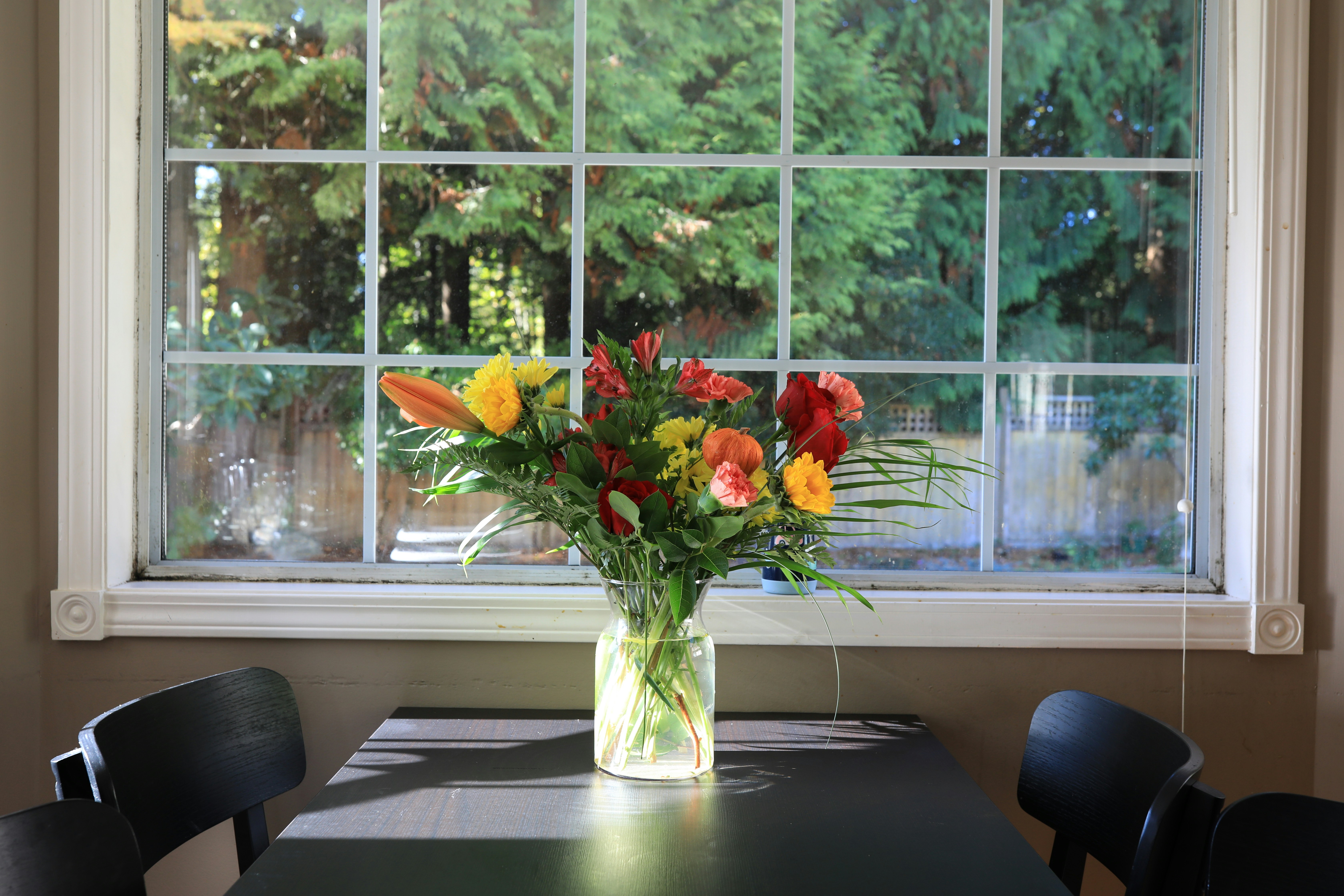 Sunlit Bouquet Centered in a Quiet Morning Kitchen