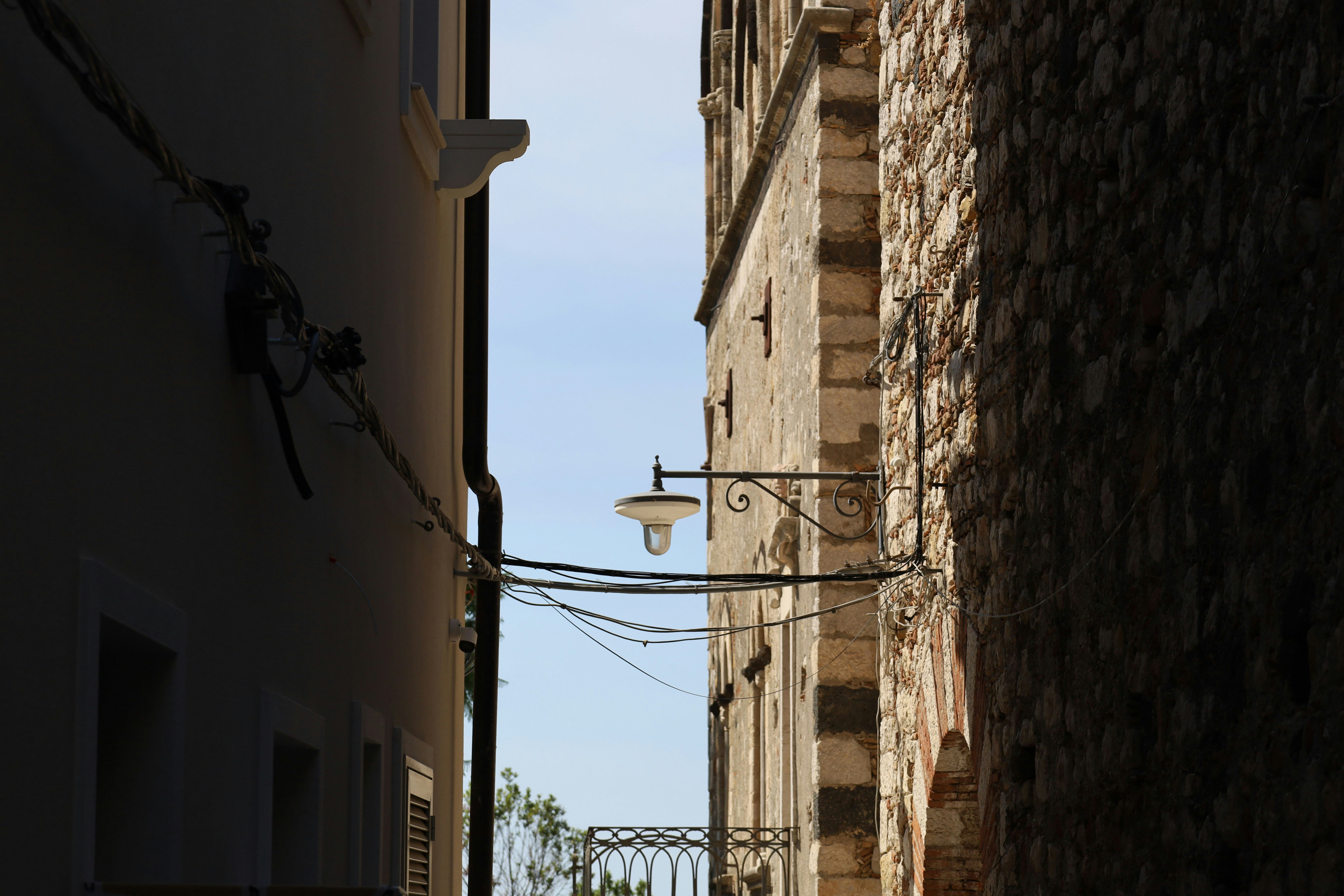 Sunlit Gap Between Stone Facades