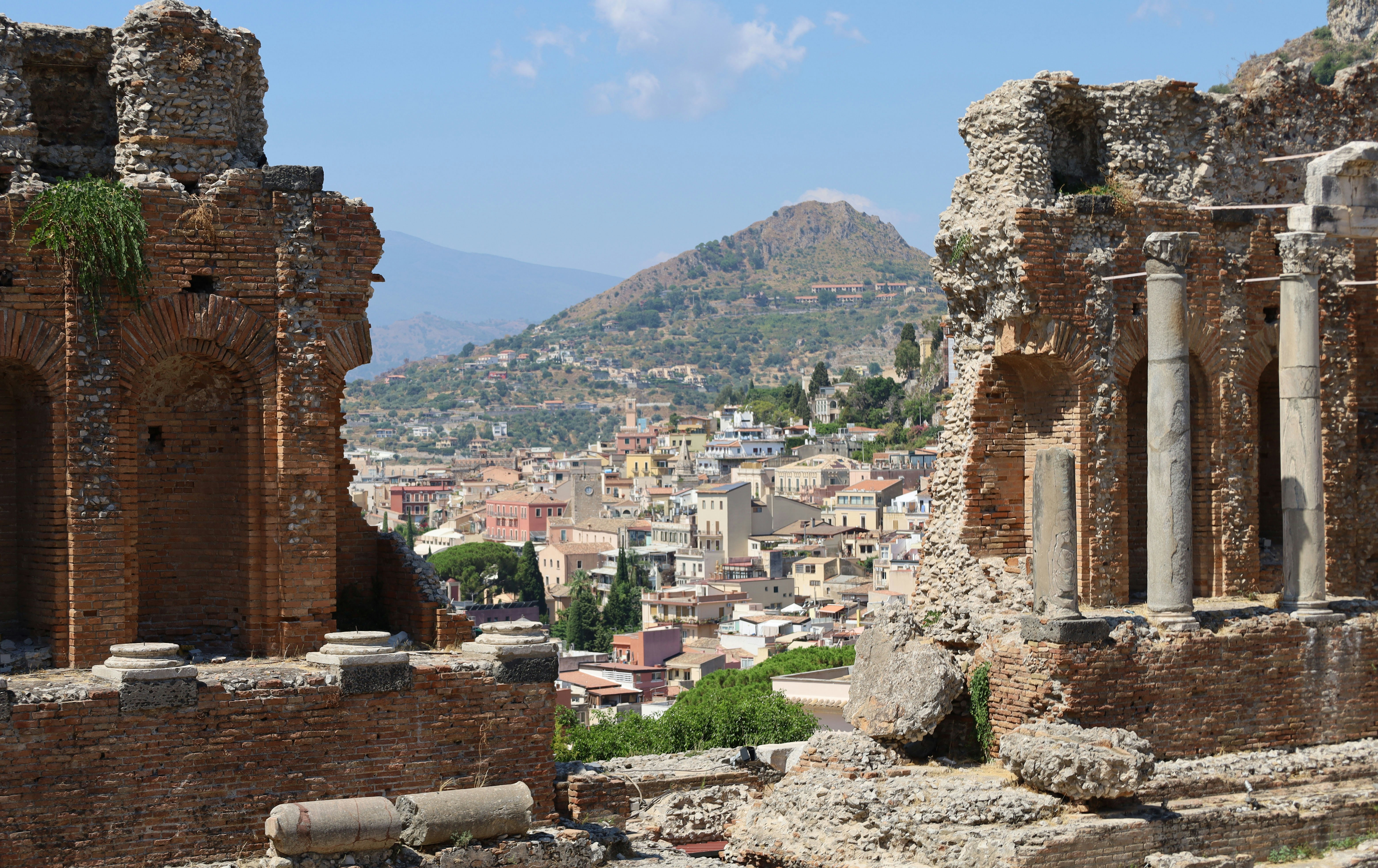 Ruin Gateways Framing a Colorful Italian Town