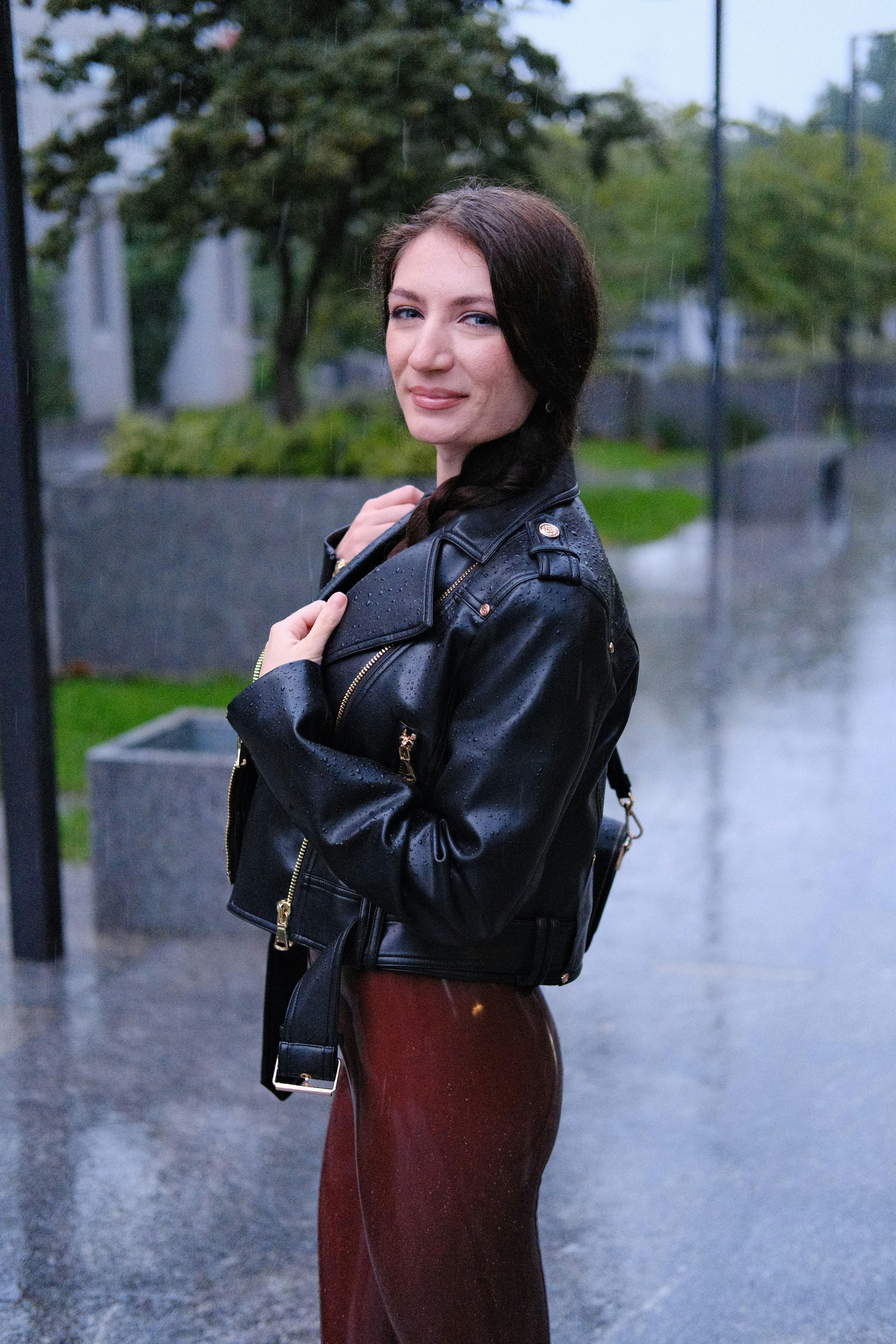 Portrait in a Drizzle: A Confident Moment in Metal and Denim