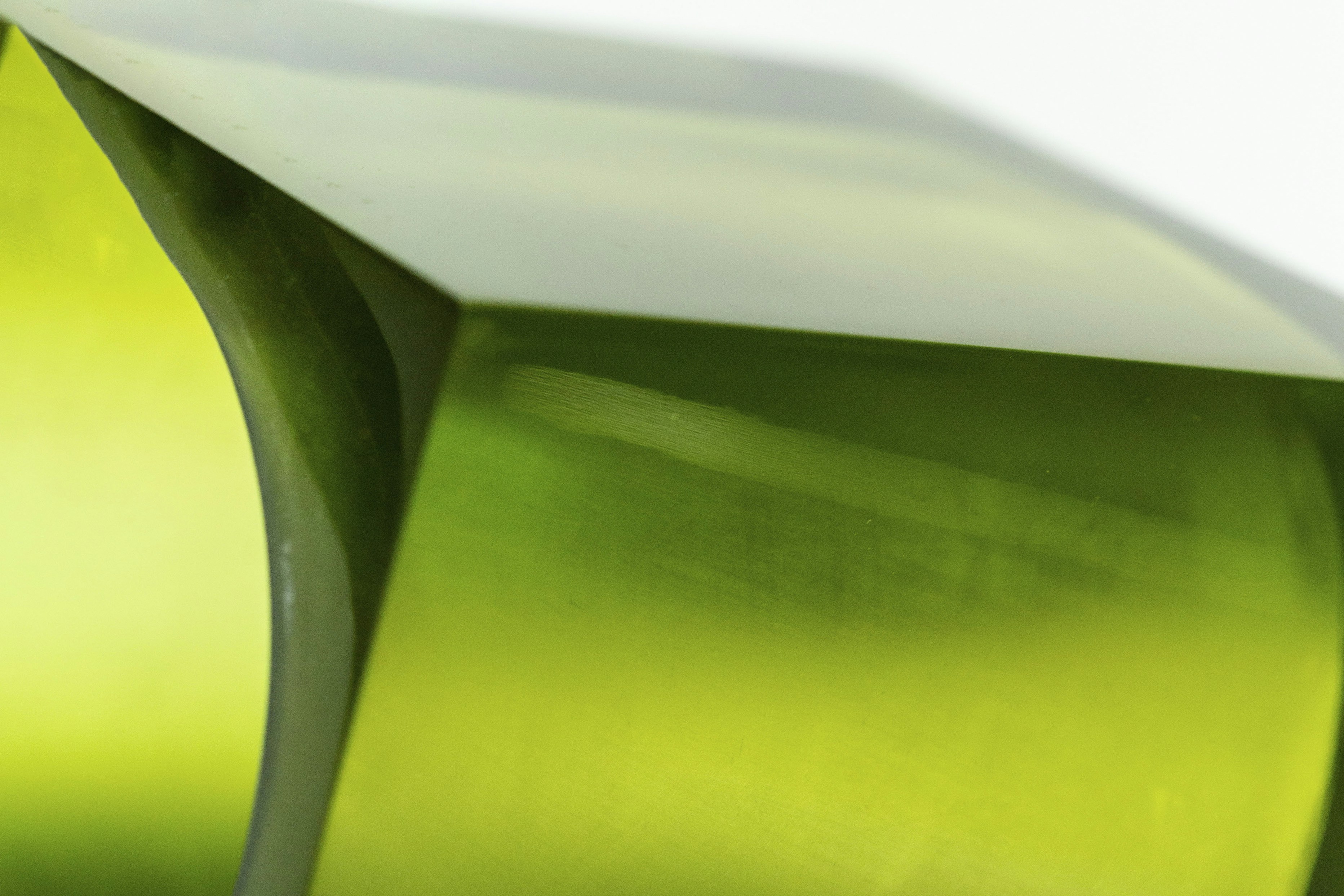 Curved Neon: A Close Encounter with Vibrant Yellow-Green Surfaces