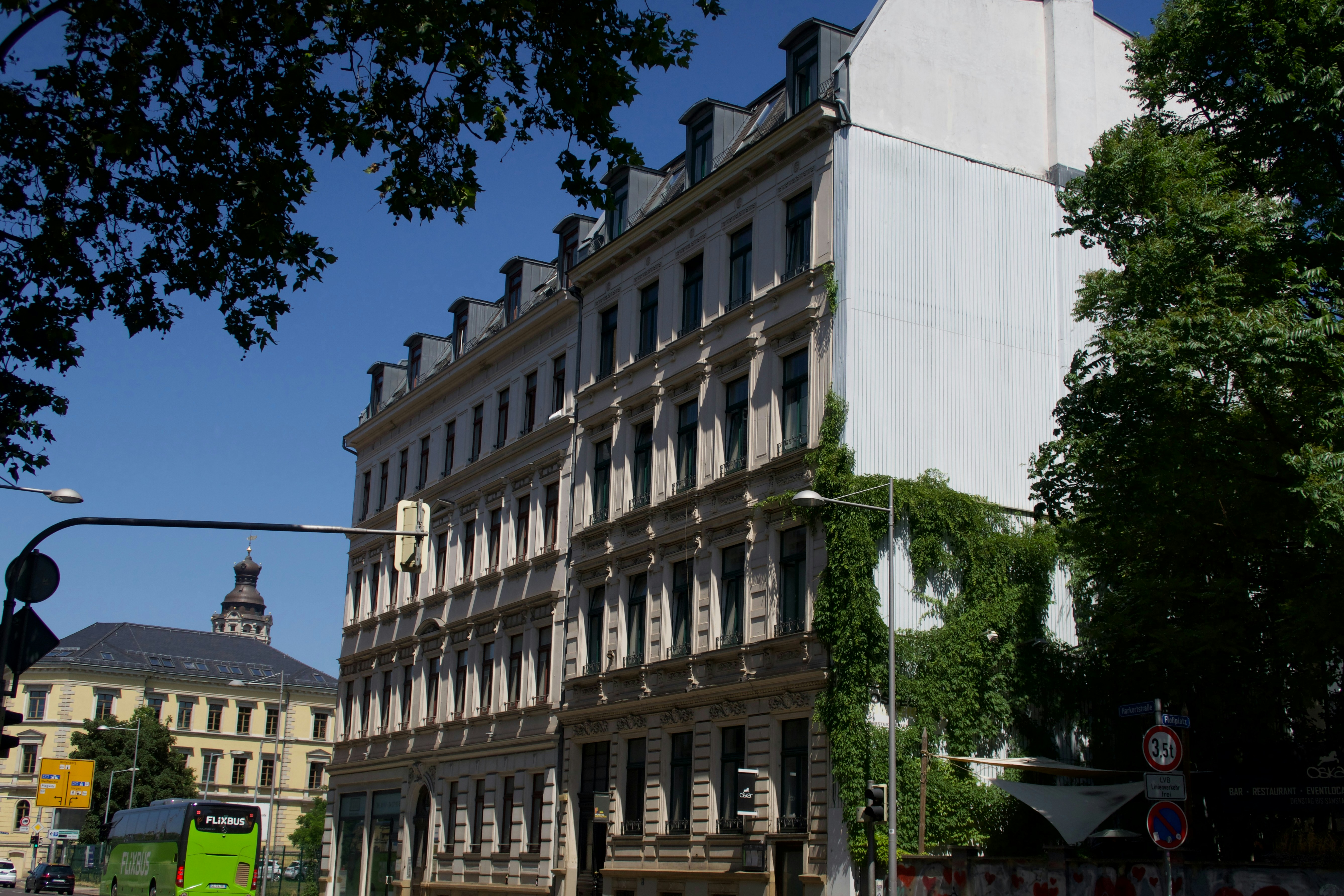 The Facade Street: Sunlit Classico in Narrow Angle