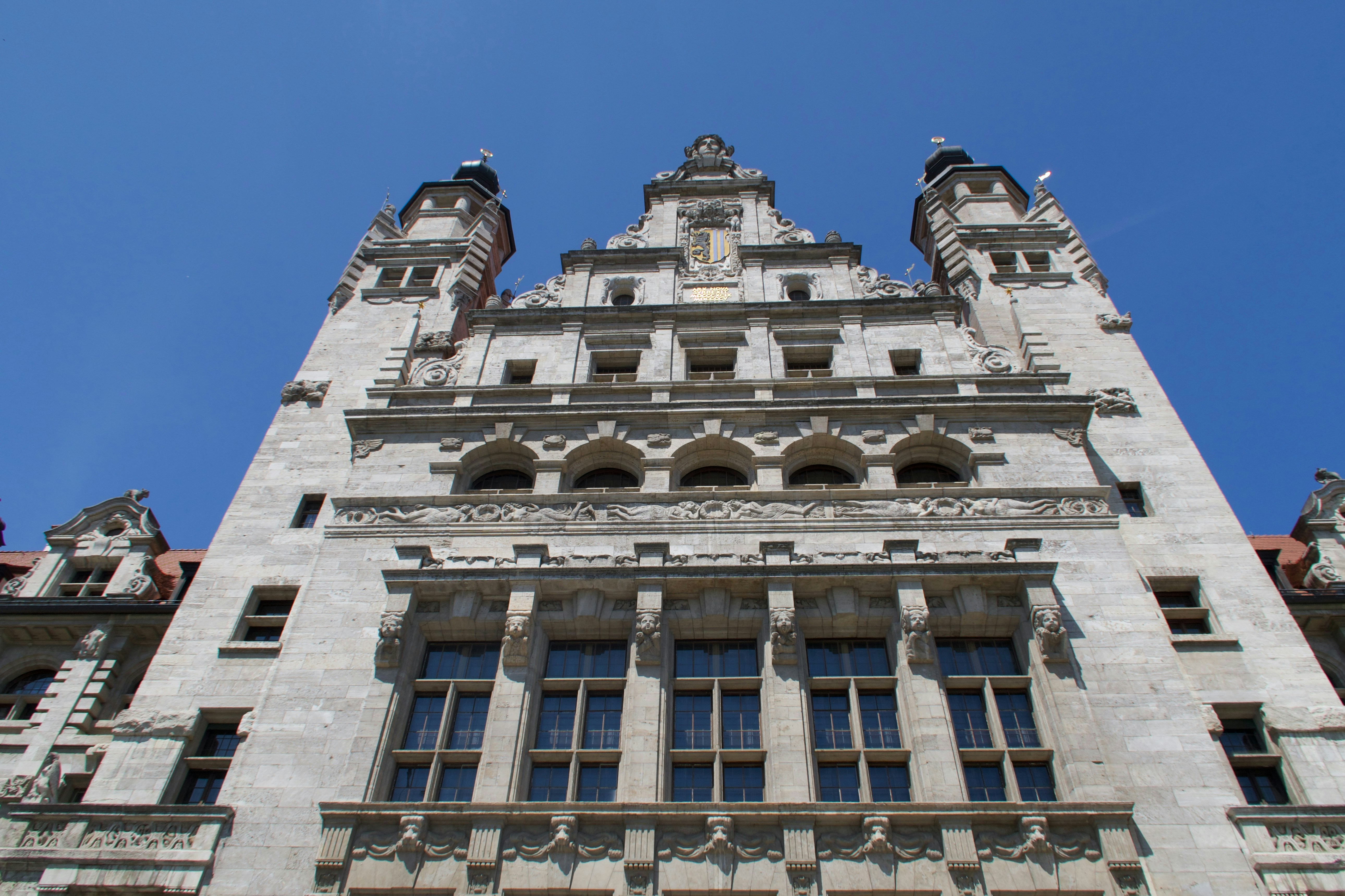 Vertical Grandeur: The Facade’s Stone Choir Reaching Toward the Sky