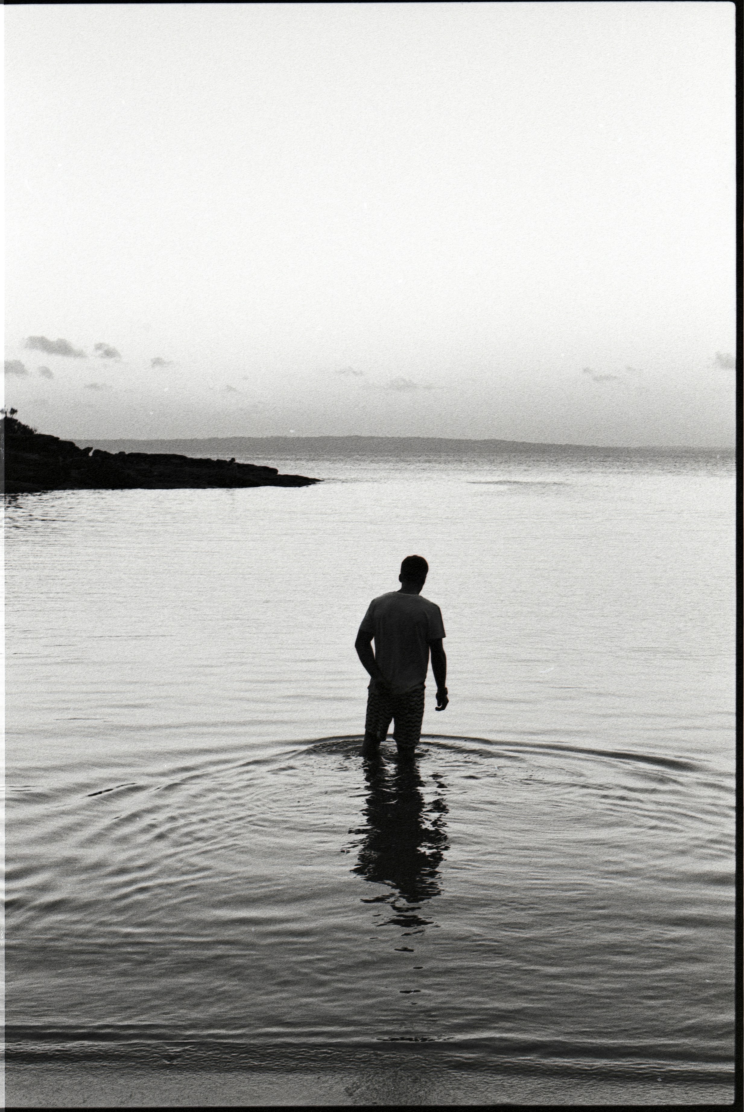 Solitary Figure in Tidal Calm