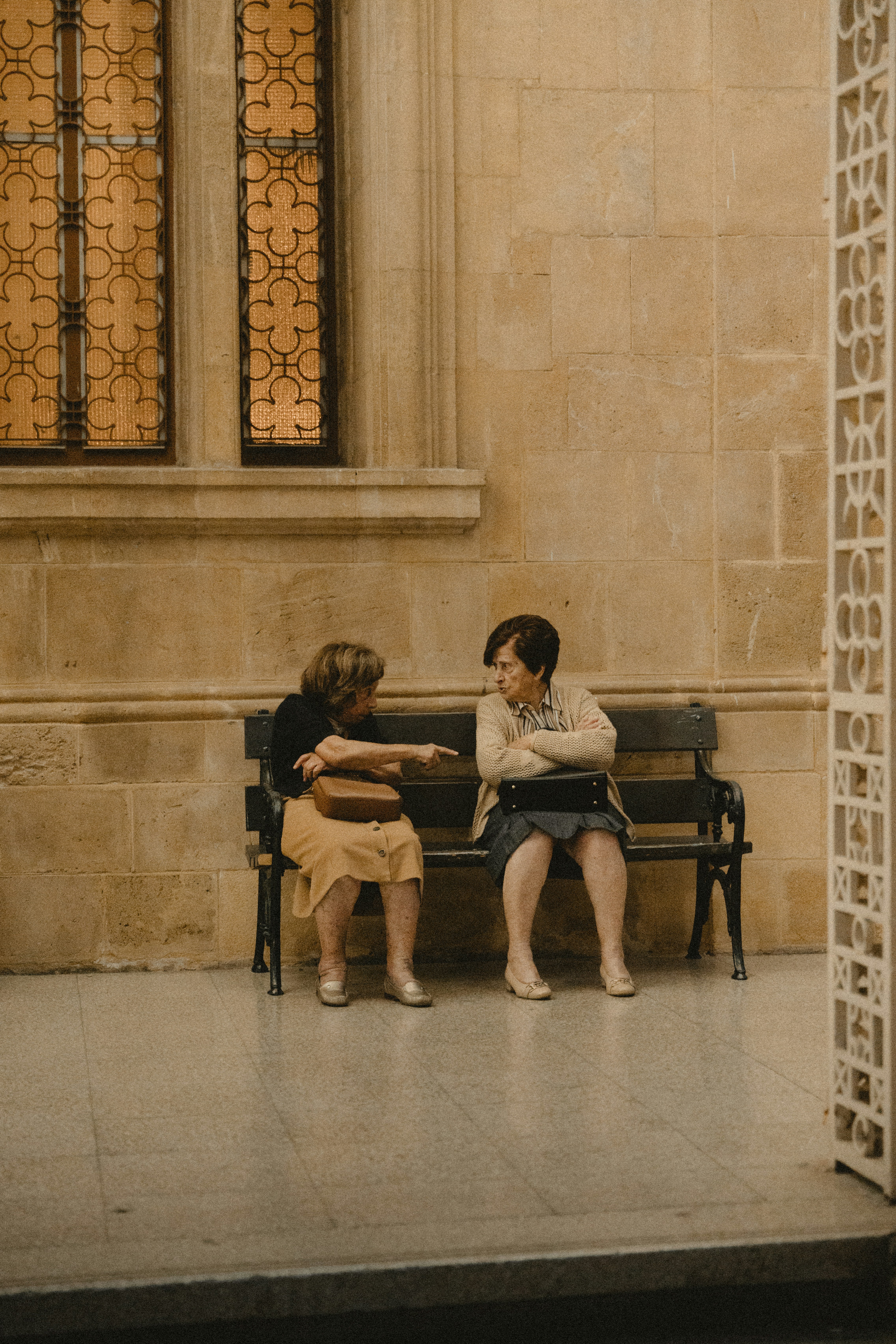 Conversations on the Park Bench: Quiet Exchange in a Stone Corridor