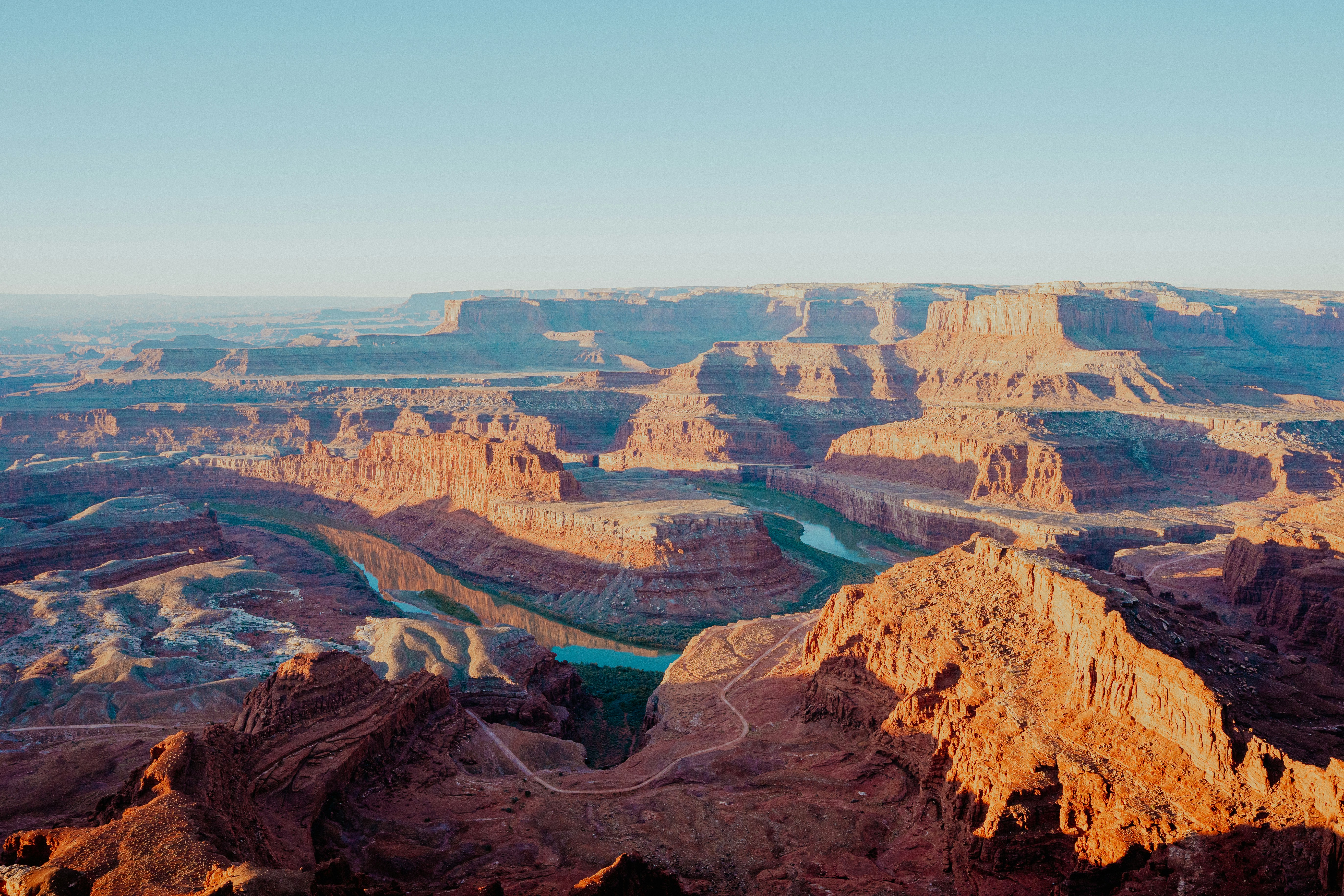 Erosion Choir: Aerial Confluence of Canyon Rivers at Dusk