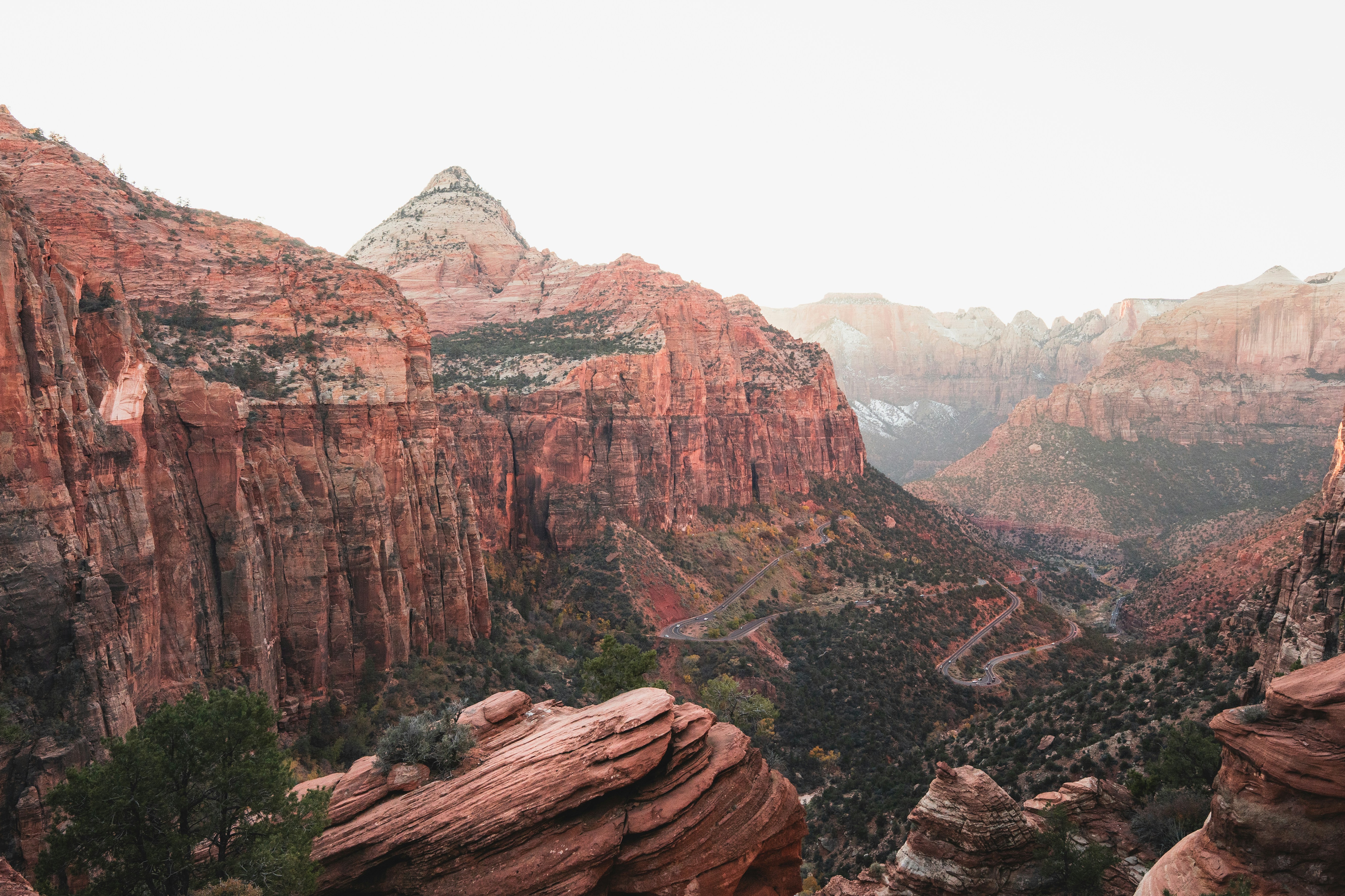 A winding road through the red rock canyons of Zion National Park