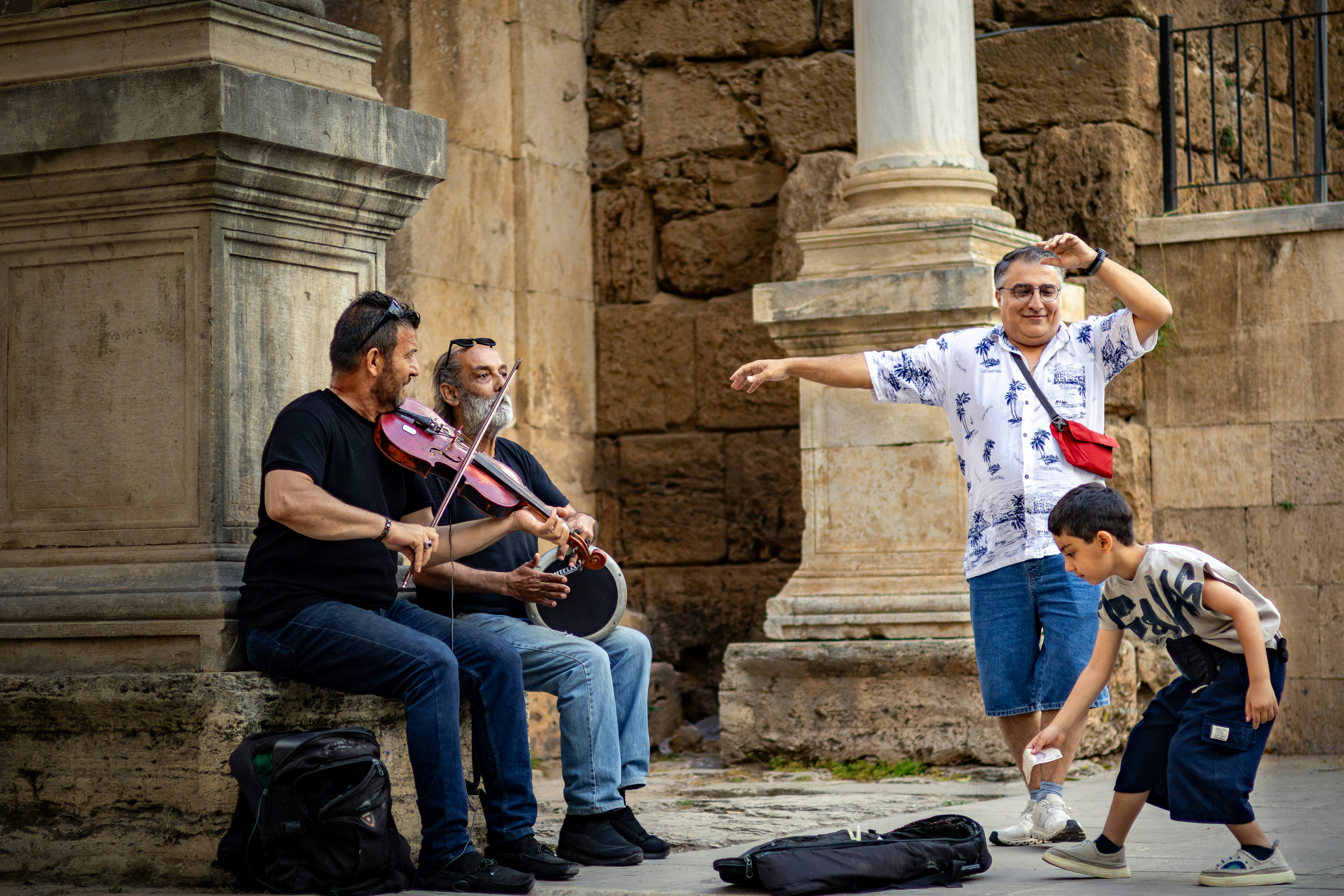 Energy in the Courtyard: A Street Ensemble and a Dancer