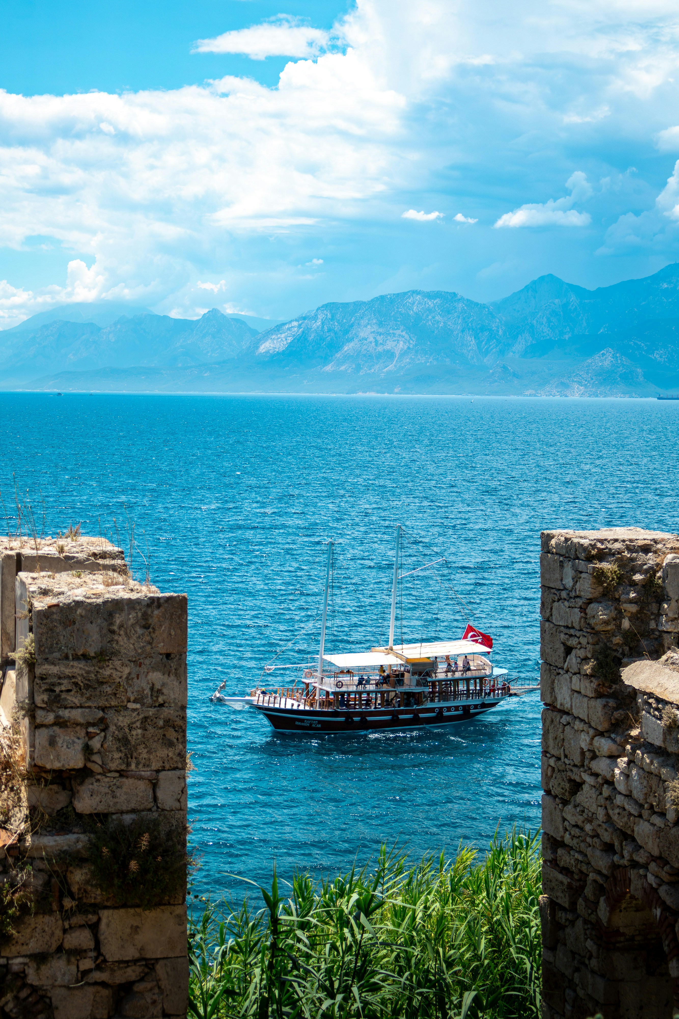 Azure Passage: A Seafront Voyage Through Stone Gateways