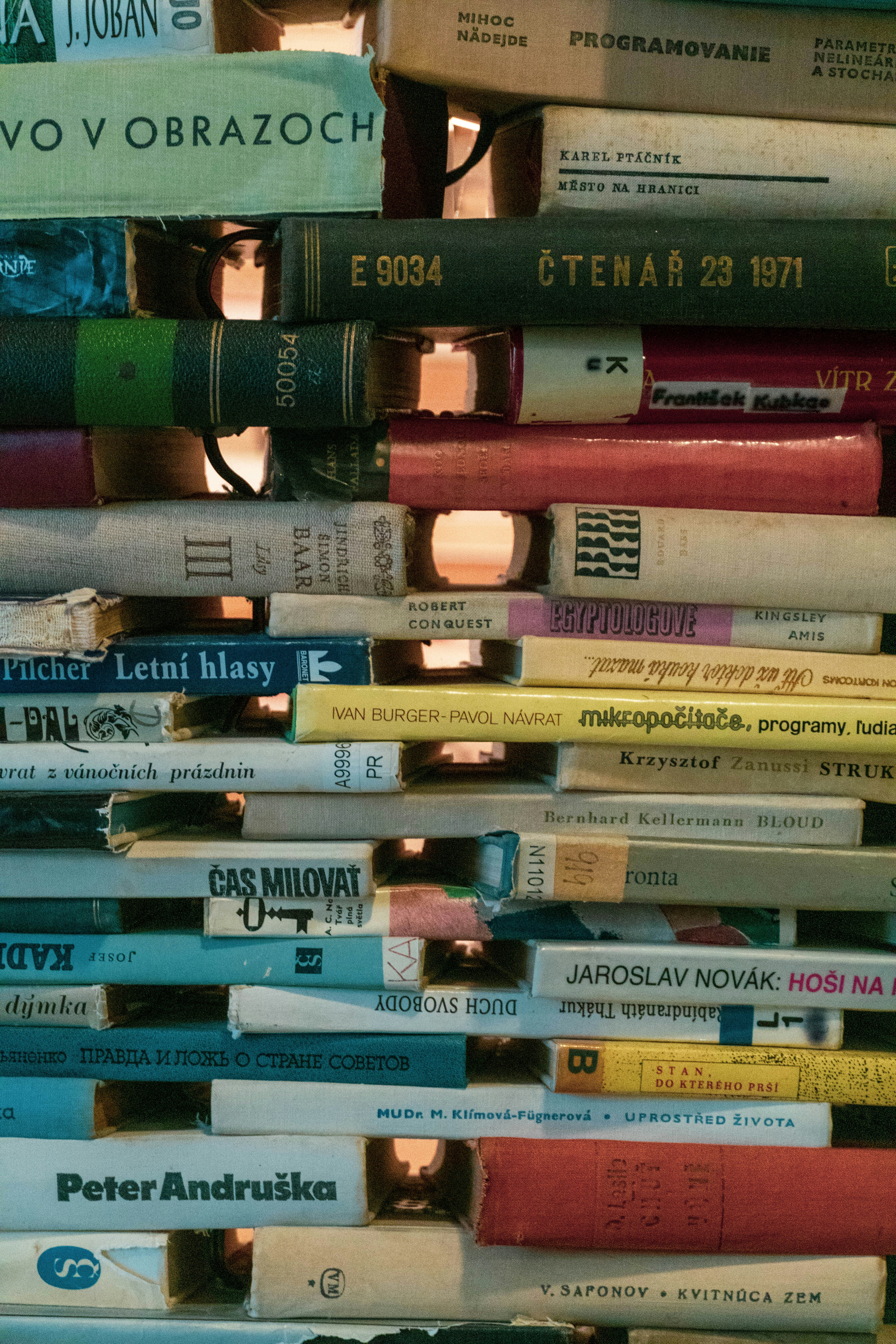 A Colorful Stack of Worn Tomes Revealing a Quiet Library Palette