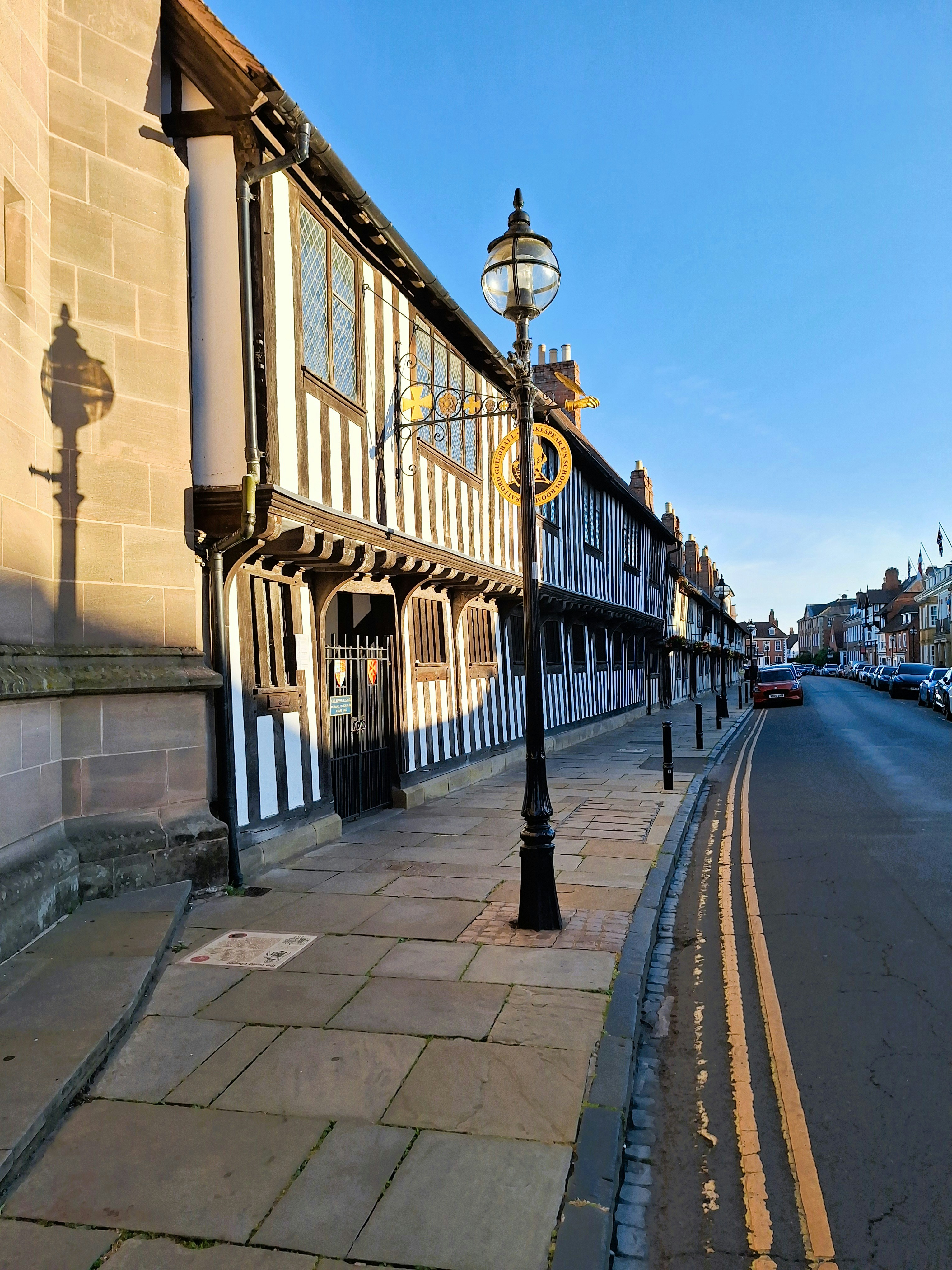 Heritage Lane: Tudor Facades and a Noon Street Lamp