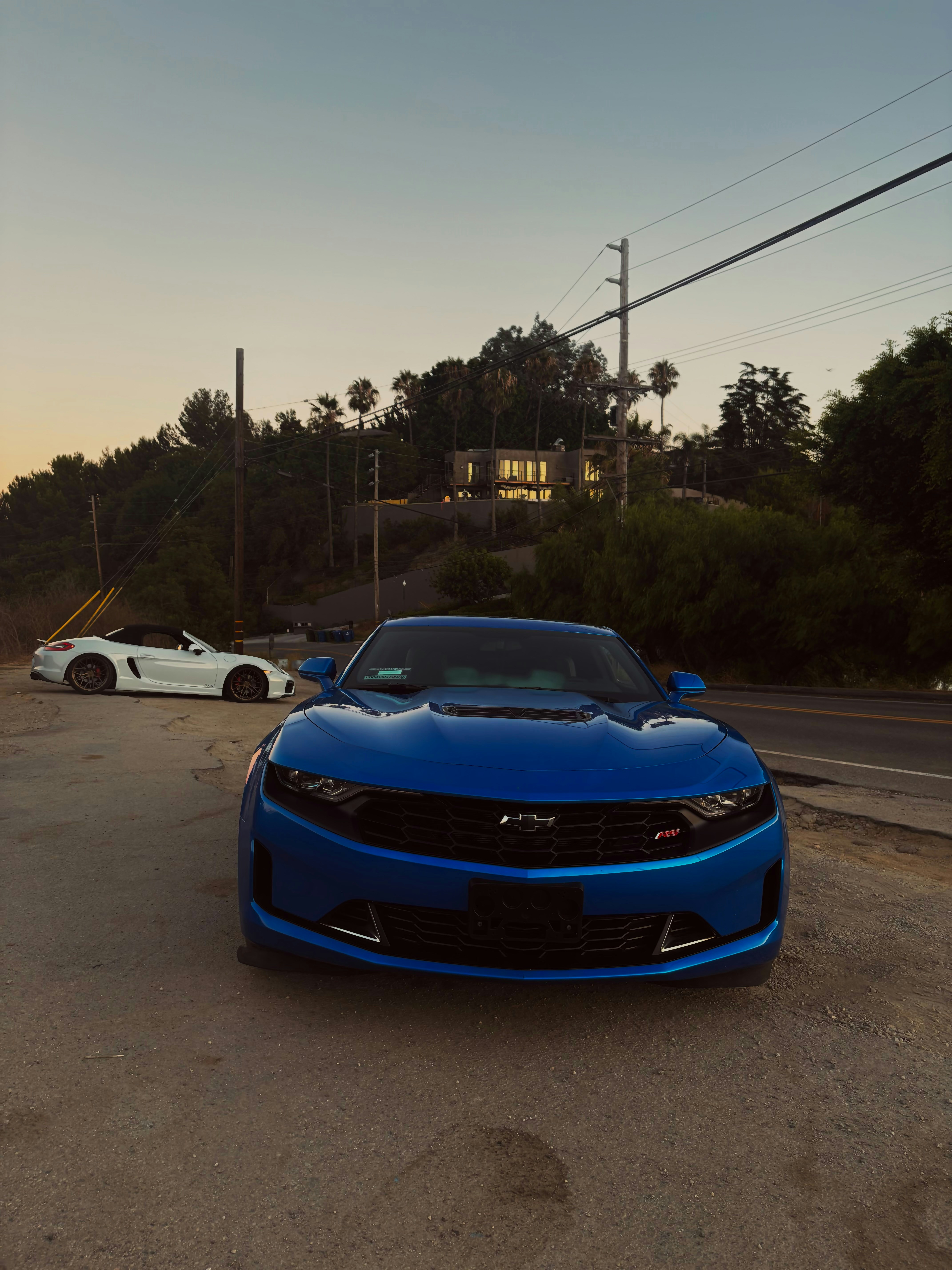 Blue Muscle: The Front-and-Center Stance of a Street-Mide Blue Mustang