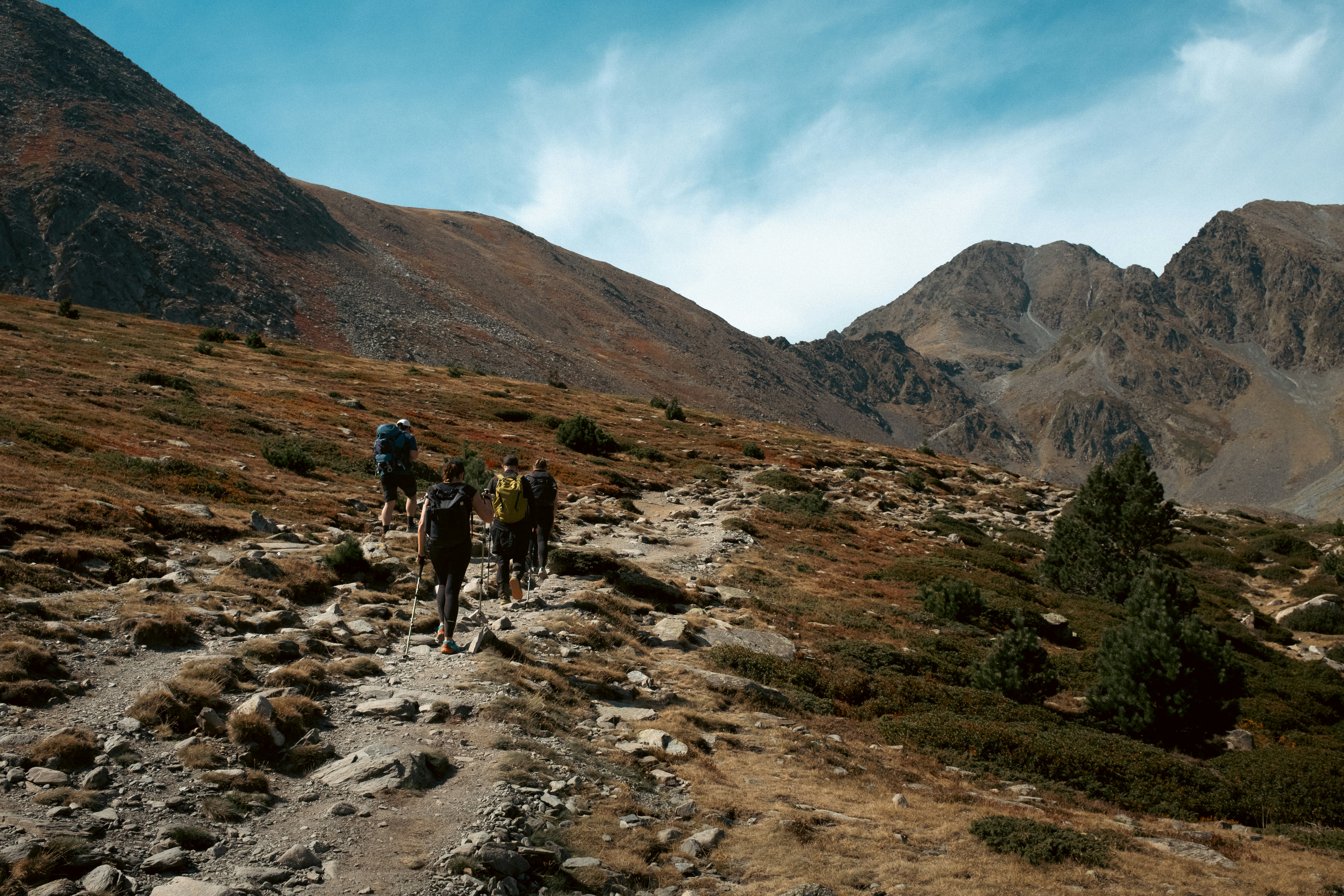 Climbers Thread a Rugged Pass Beneath Alpine Peaks