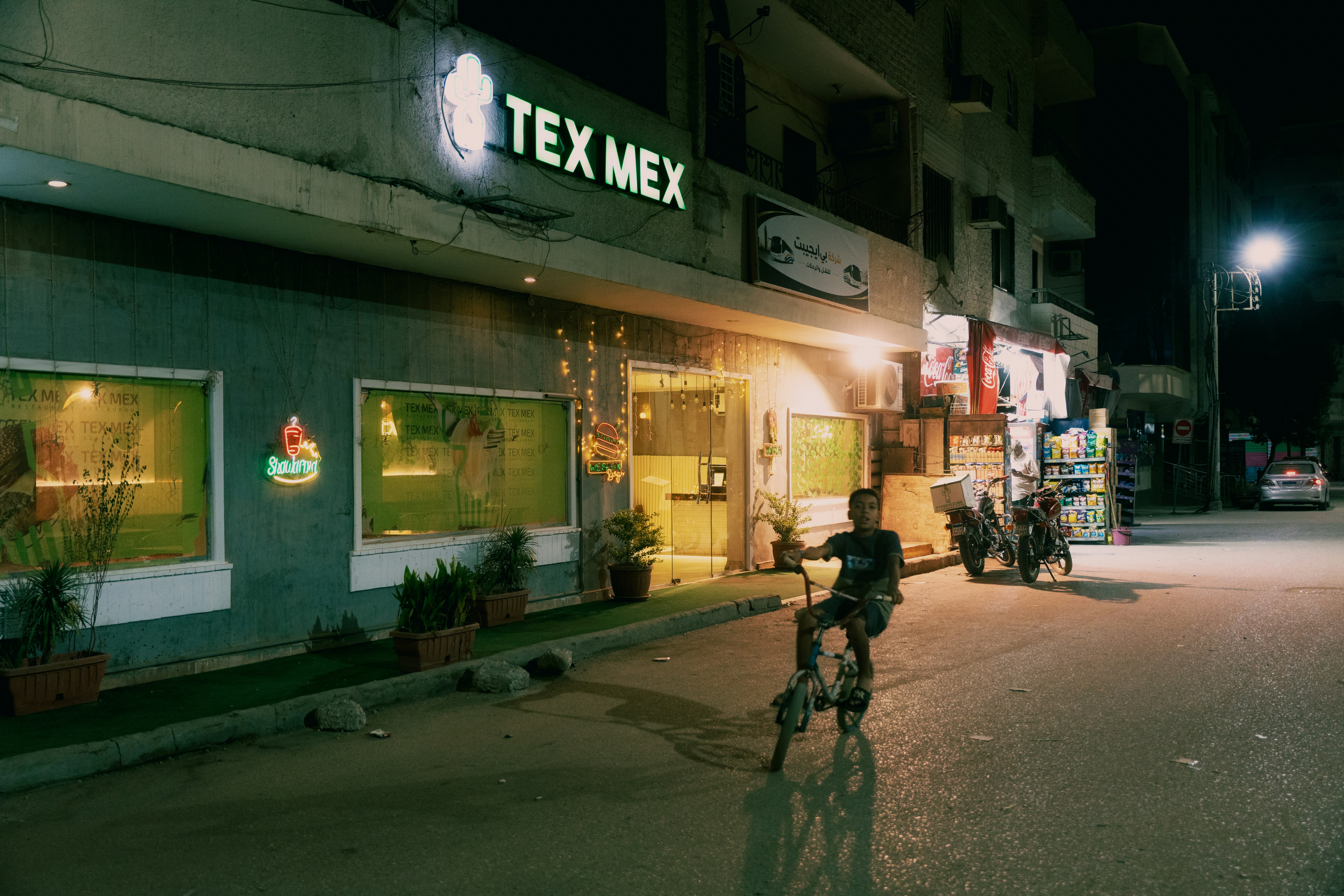 Night Riders in a Neon Street