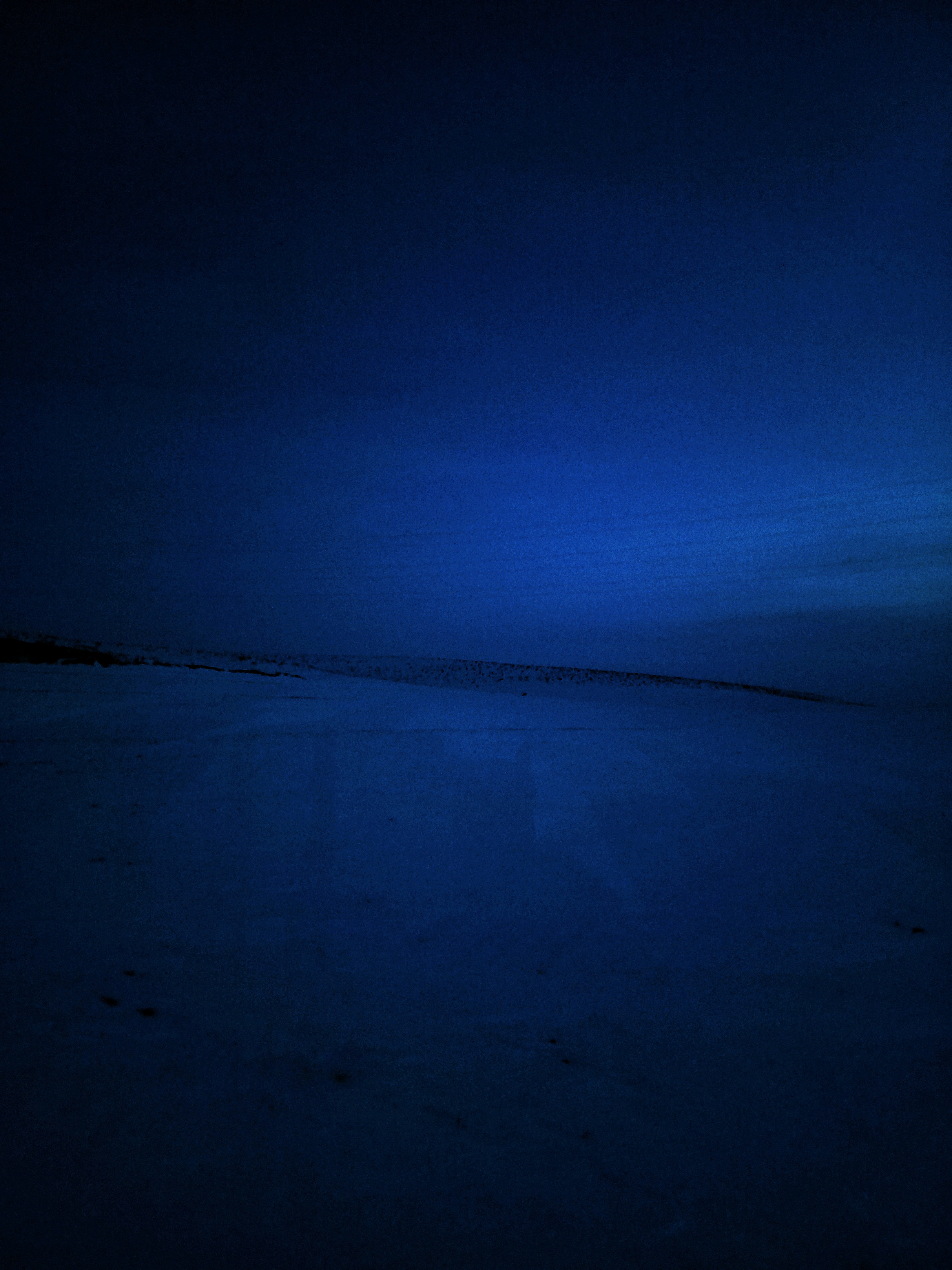 Moonlit Dunes: A Quiet Blue Horizon