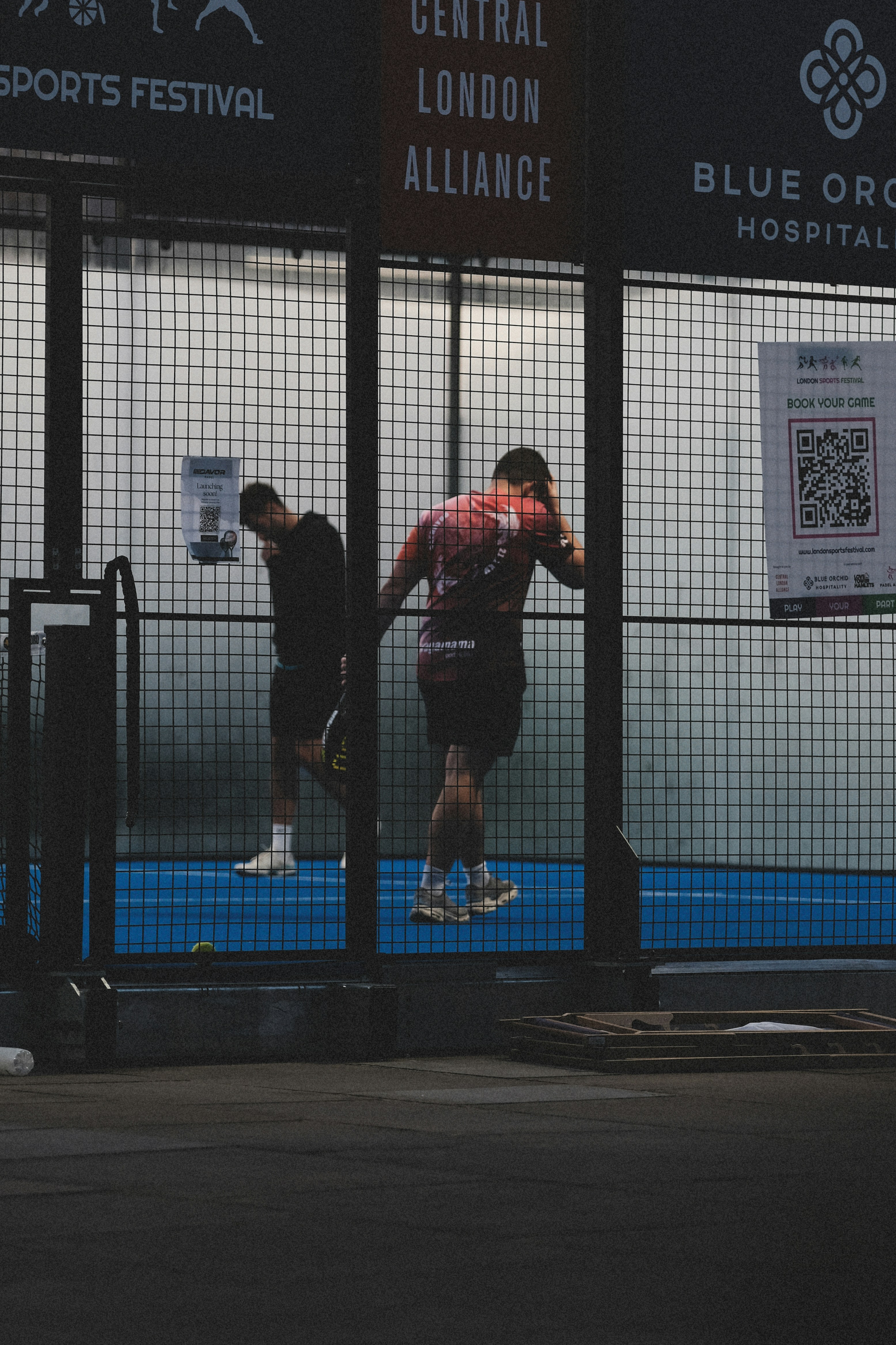 Midnight Muay: Two Fighters in a Cage of Night and Neon