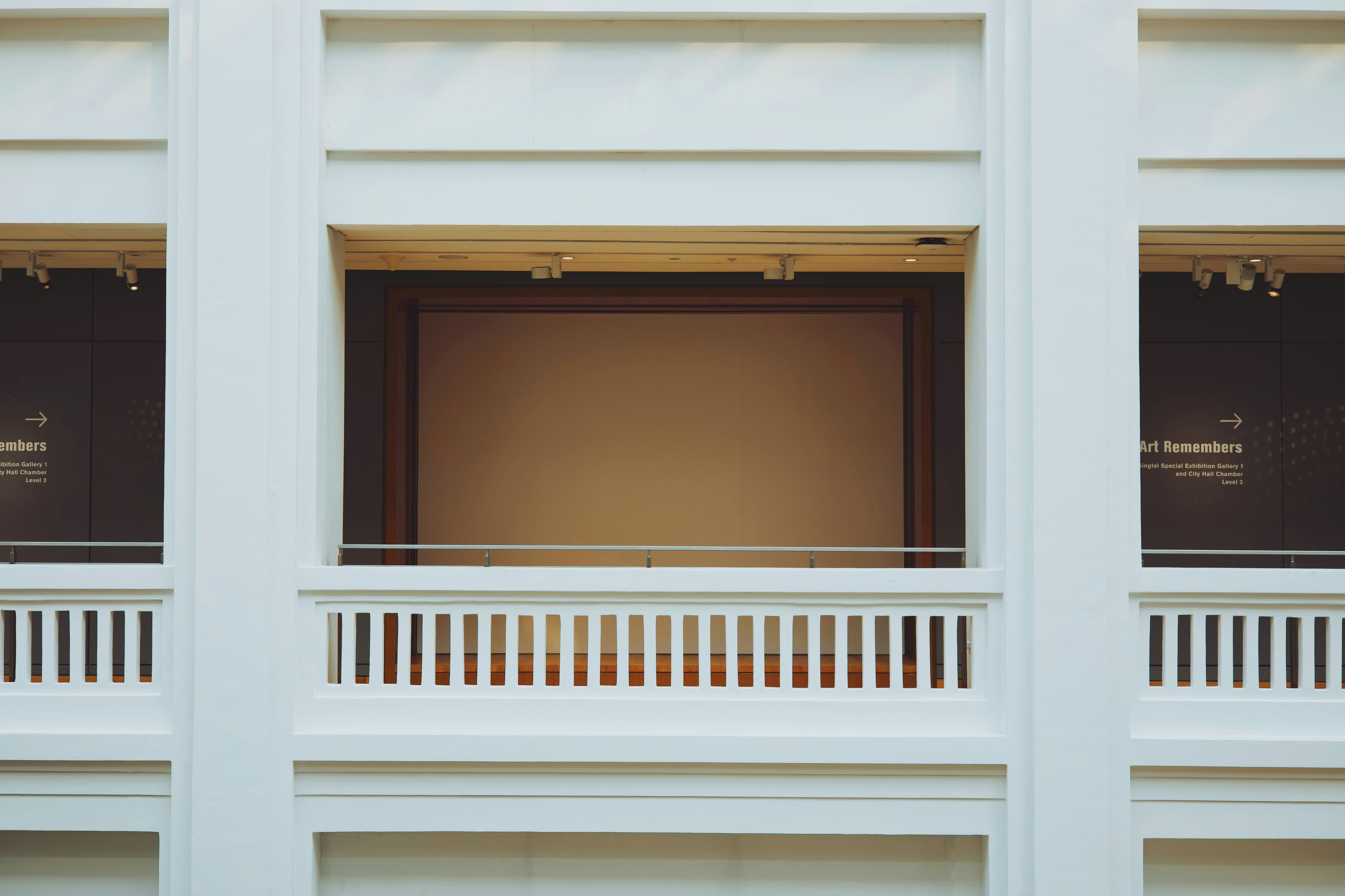 Symmetric Atrium: A Quiet Central Balcony Singularity