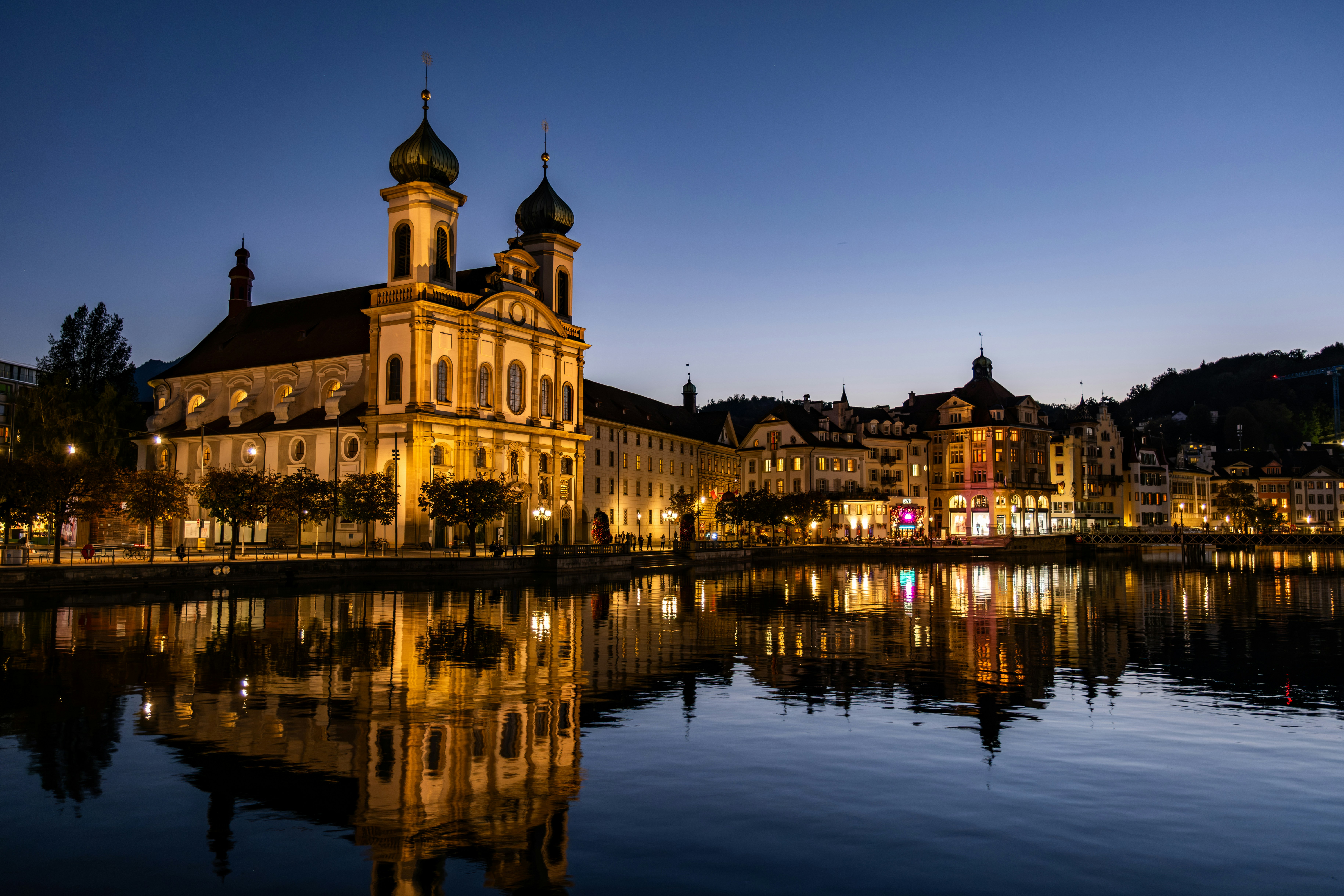Golden Facades on the Water: Night Reflections in a Baroque Town