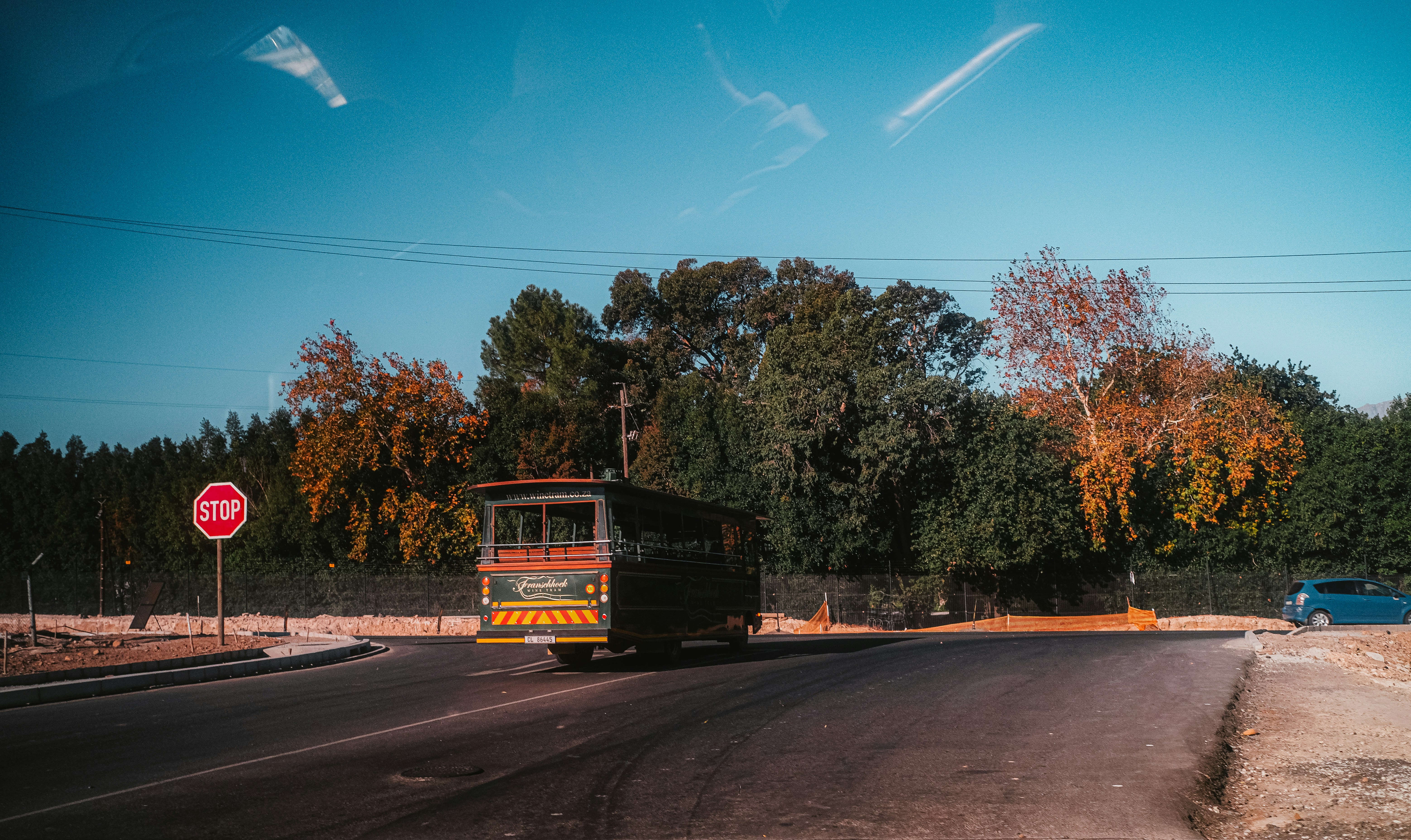 Autumn Drive: A Lone Bus on a Quiet Road