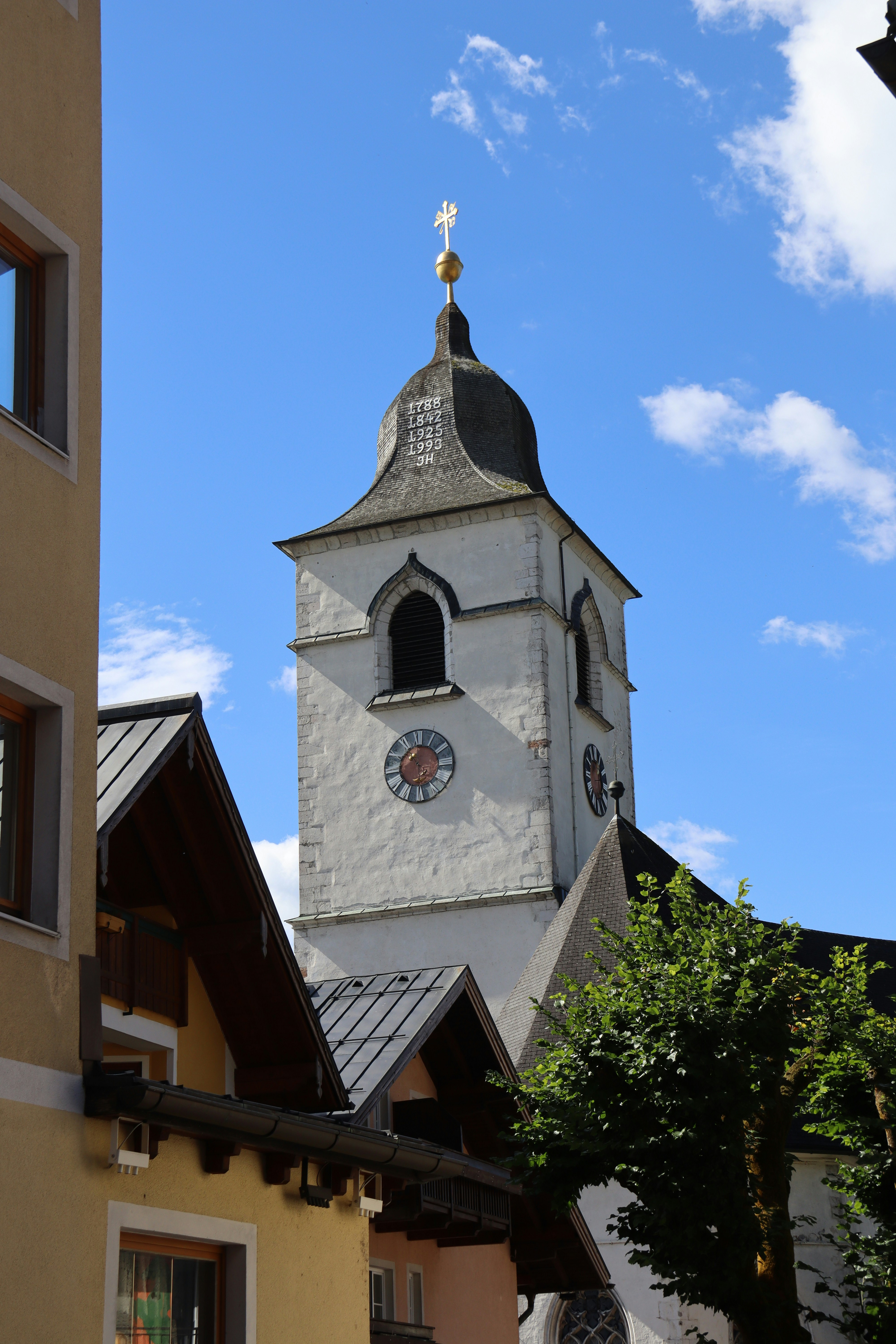 Tower Clock Under a Bright Bavarian Sky