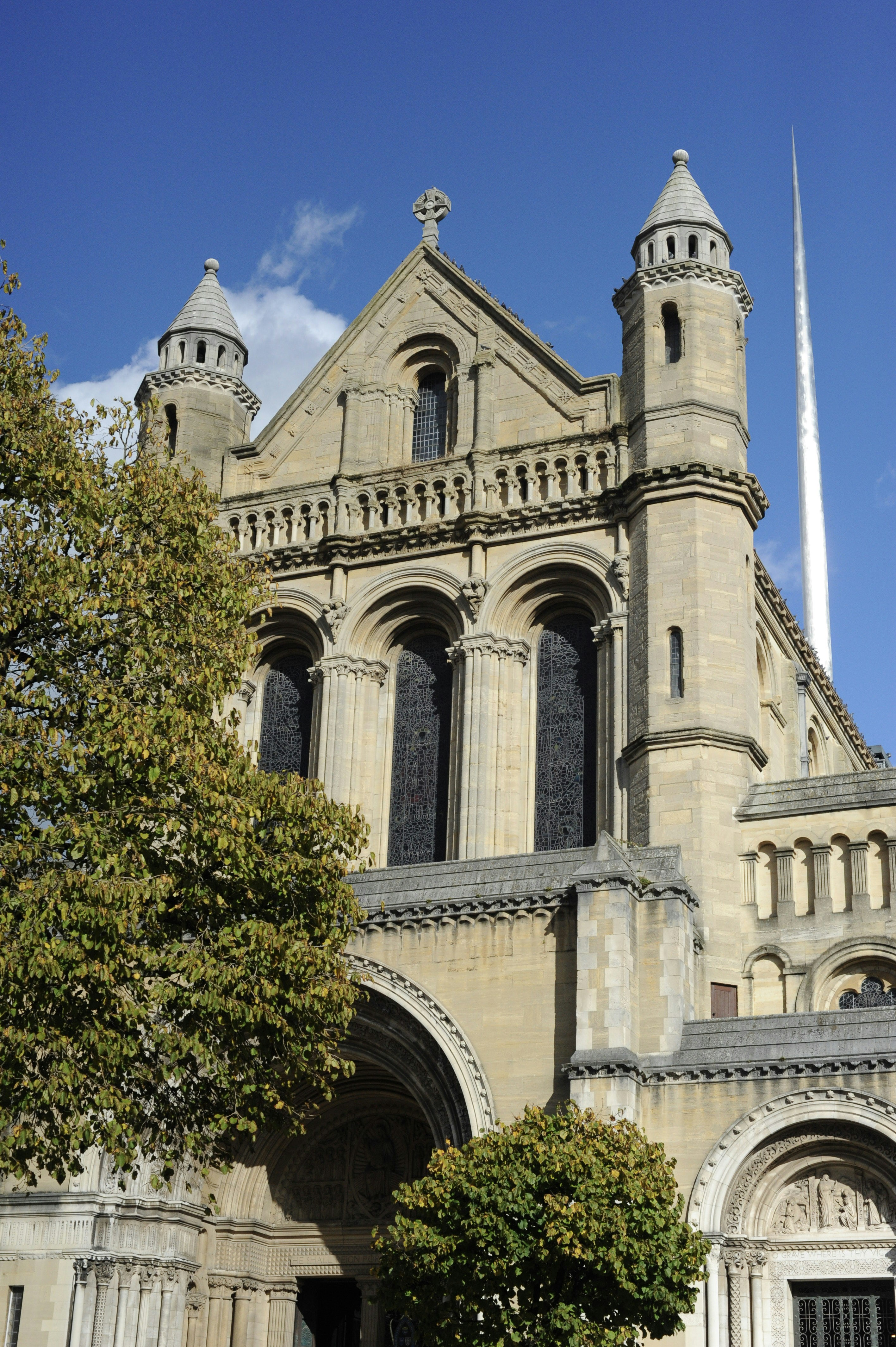 Stone Cathedral Rising: Towers, Arches, and a Blue Sky
