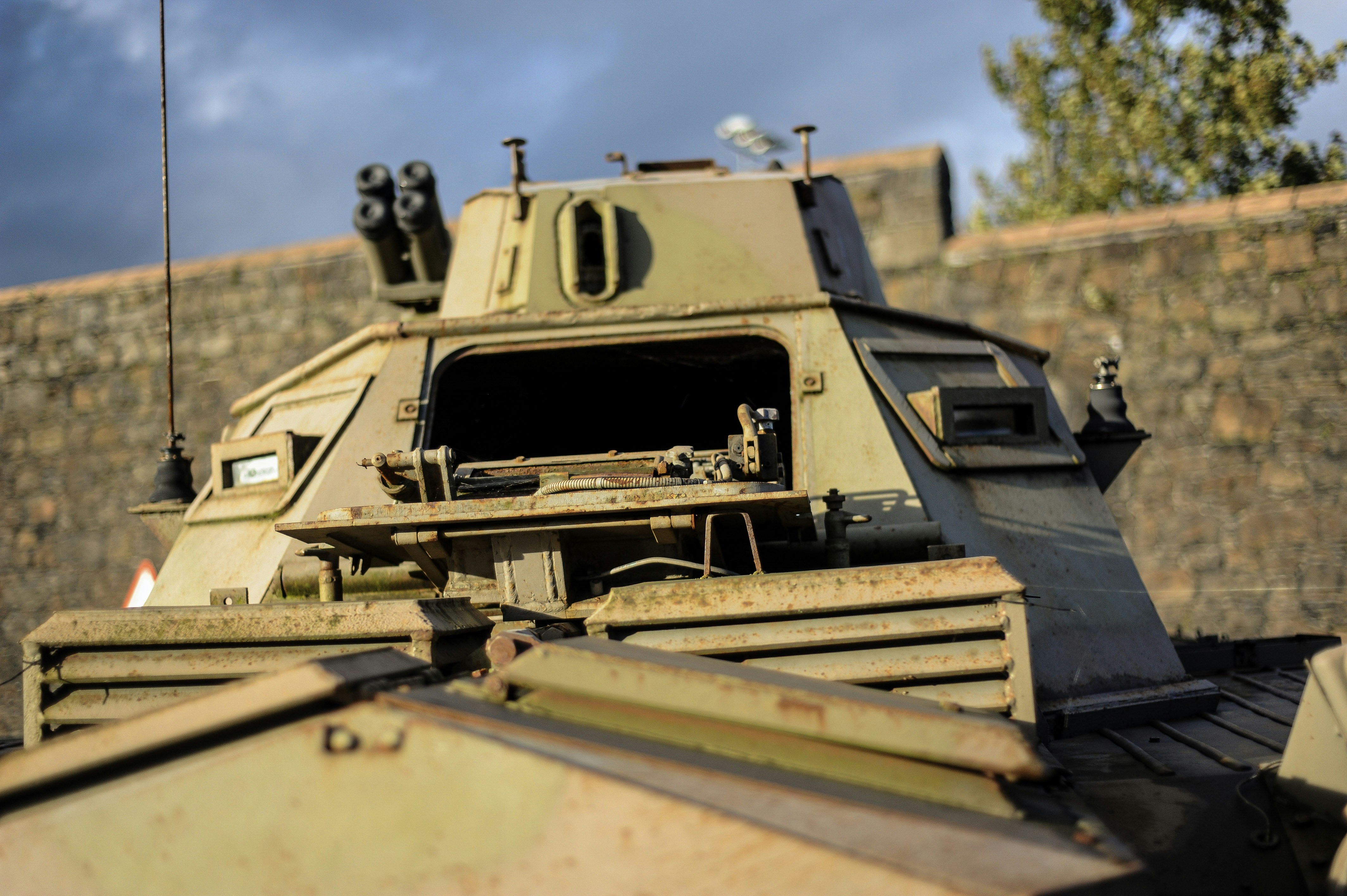 Hardened Gaze: A Military Vehicle Close-Up in Morning Light