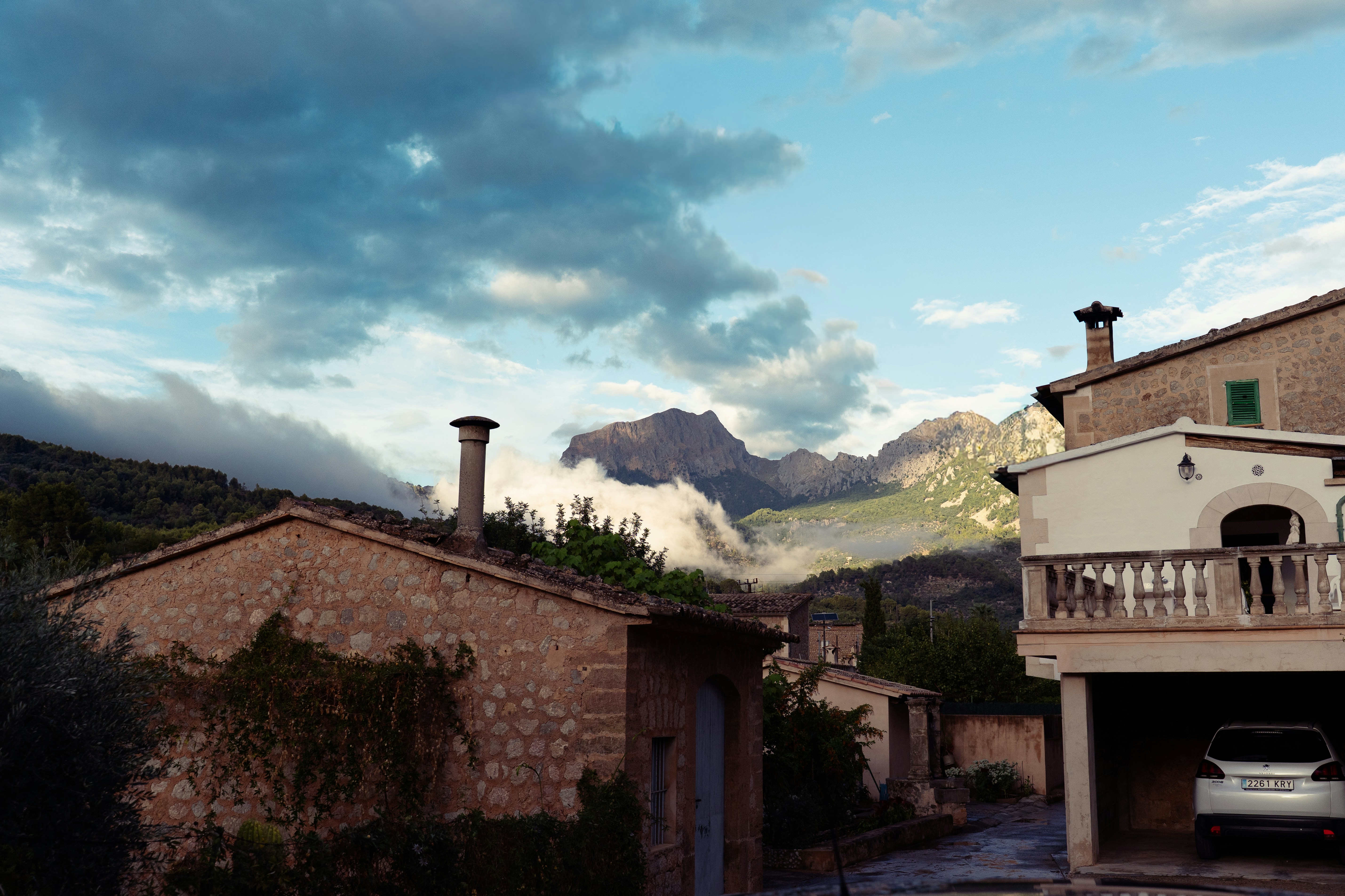 Cretan Village Terrace Beneath A Mountain Vista