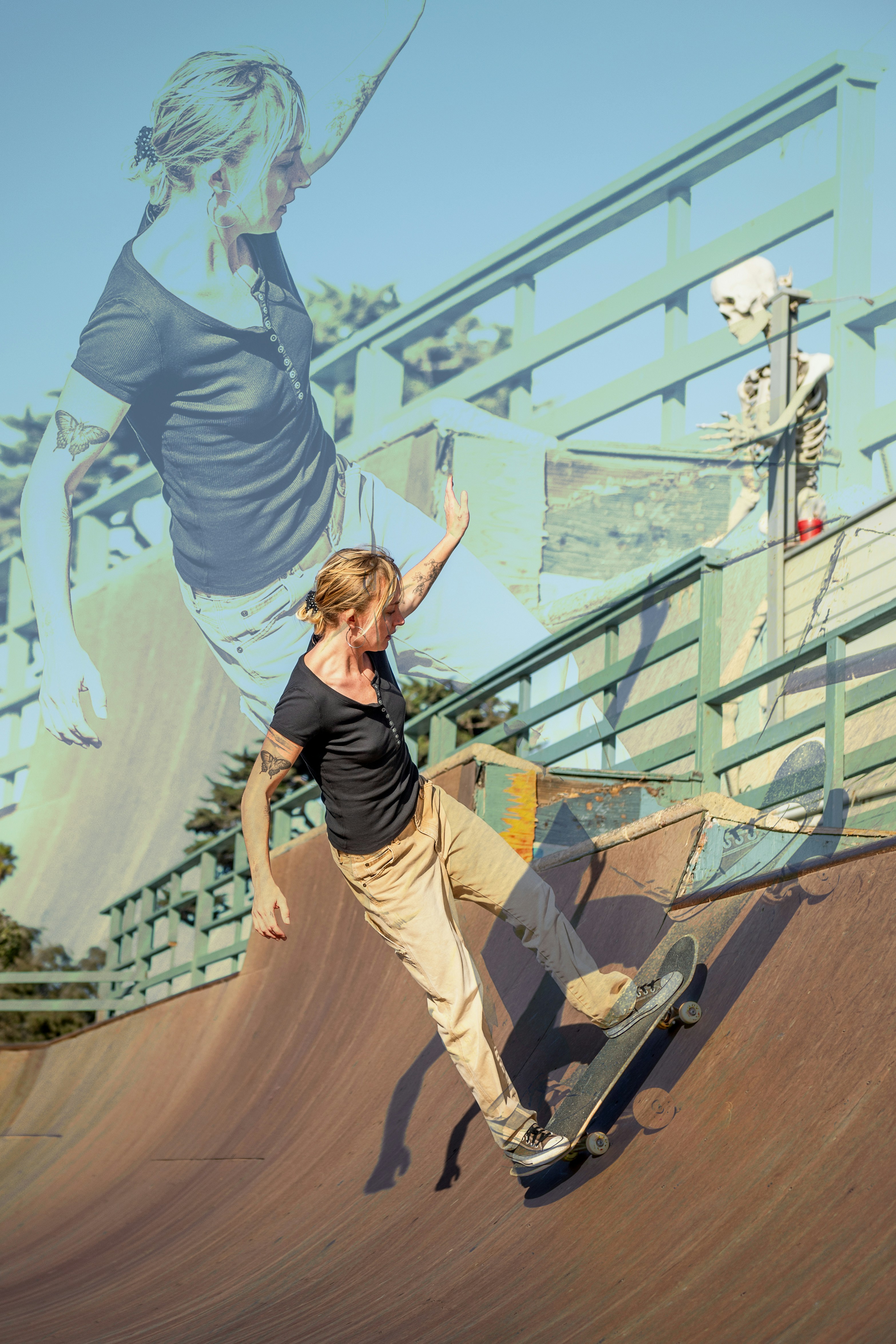 Skateboarder carving a ramp with a translucent superimposed image of herself, creating a layered, dreamlike scene at a sunny skatepark.